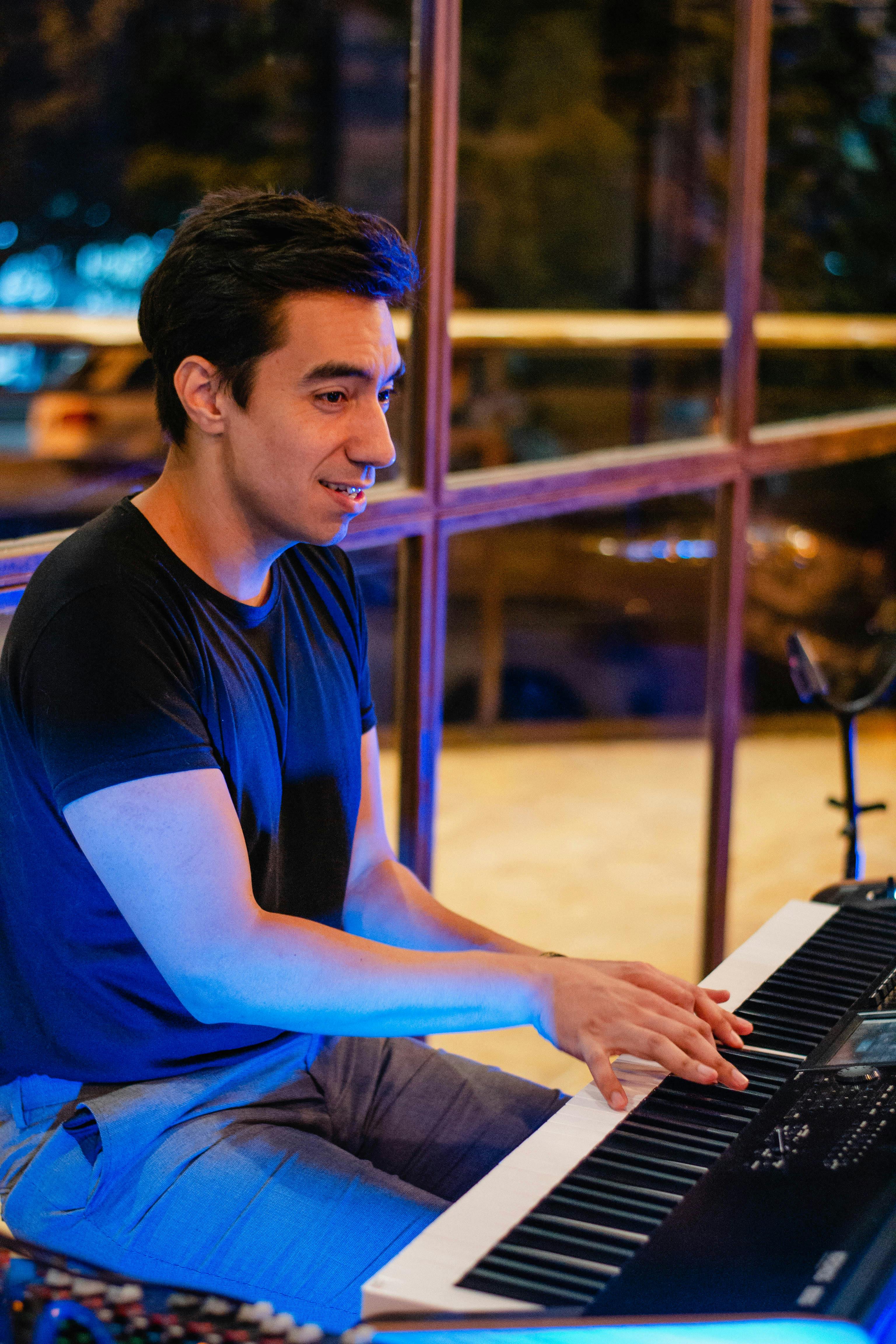 Man Playing Synthesizer · Free Stock Photo