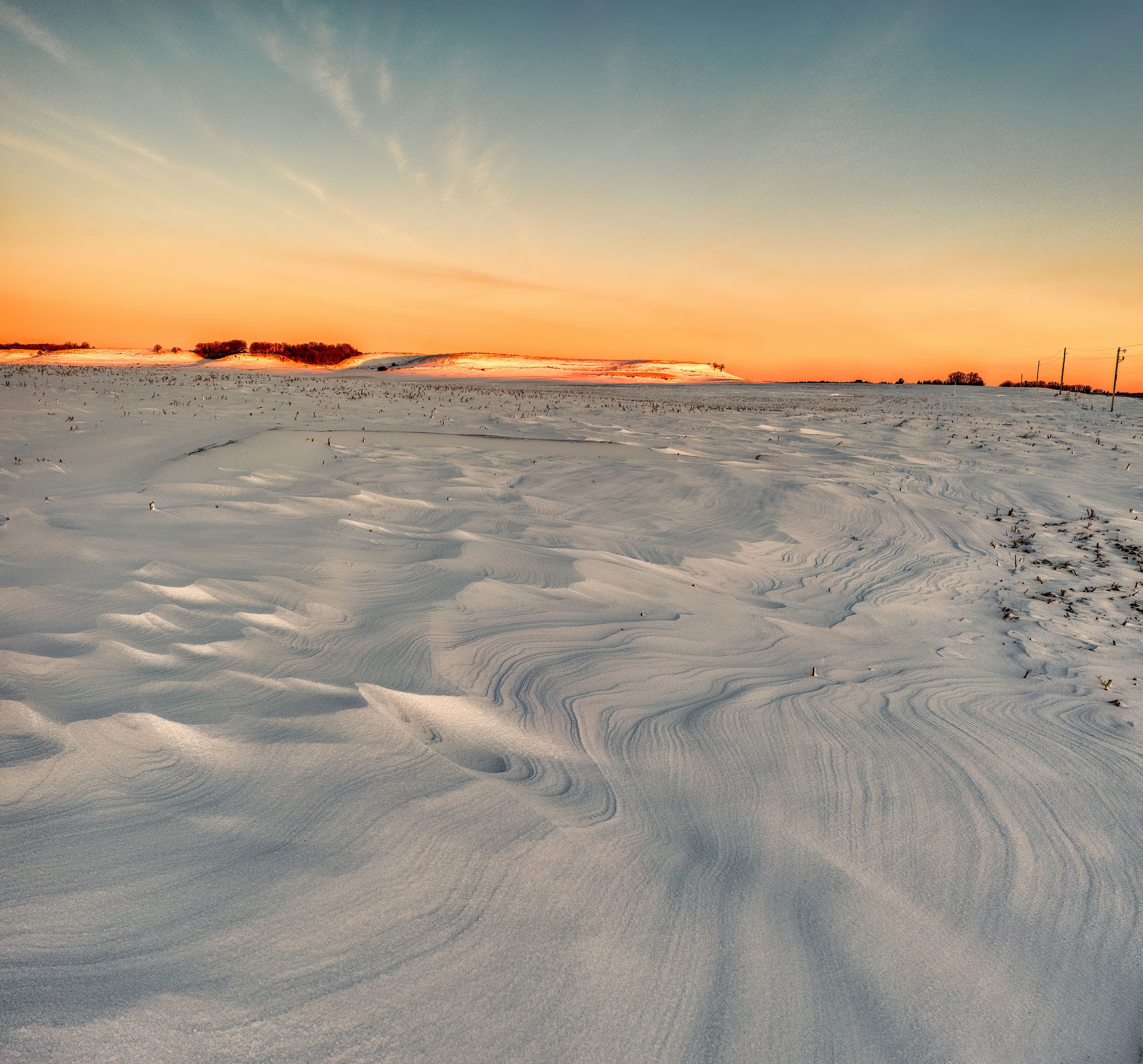 Photo of a Field Covered with Snow at Sunset · Free Stock Photo