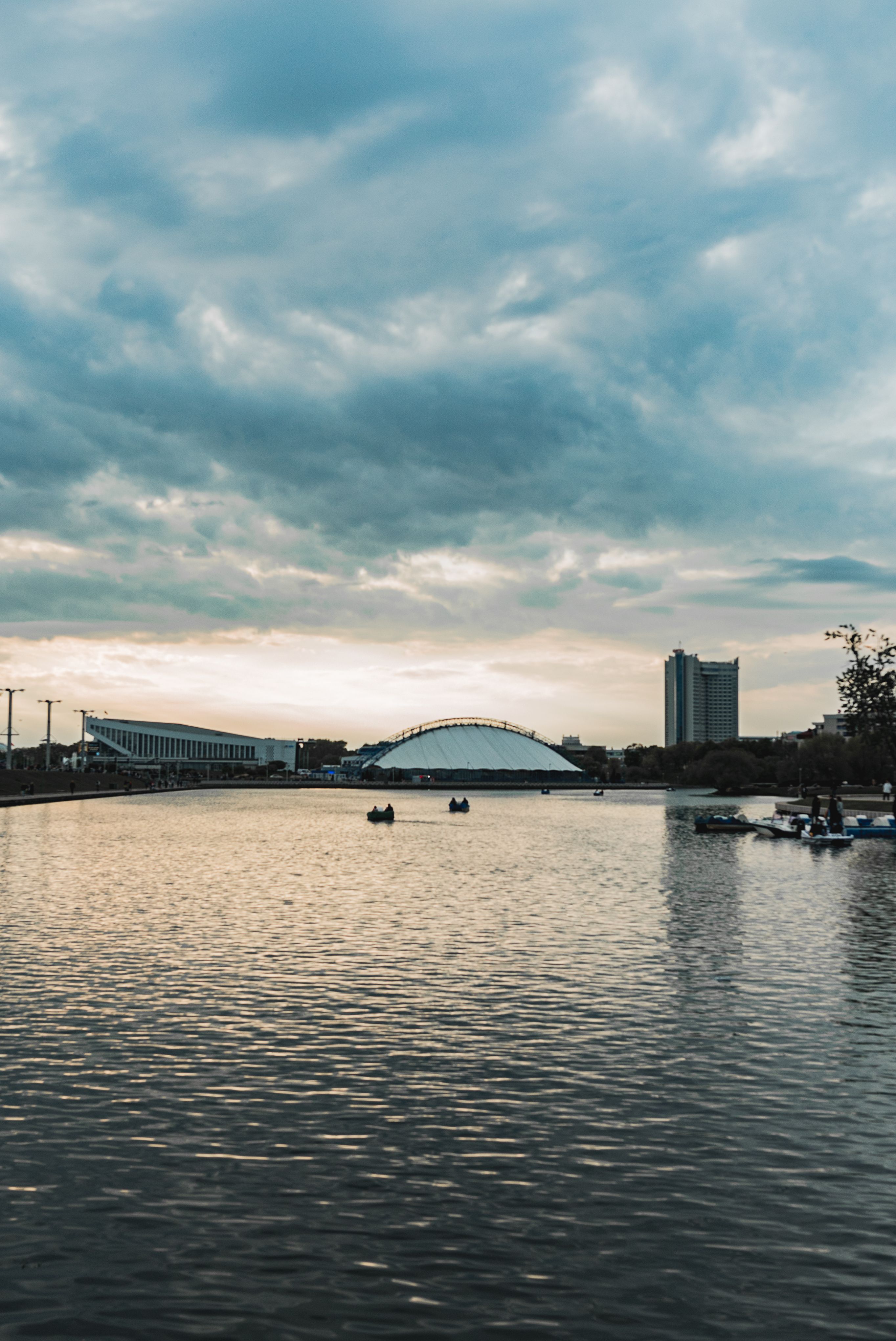 Rain Clouds over City River · Free Stock Photo