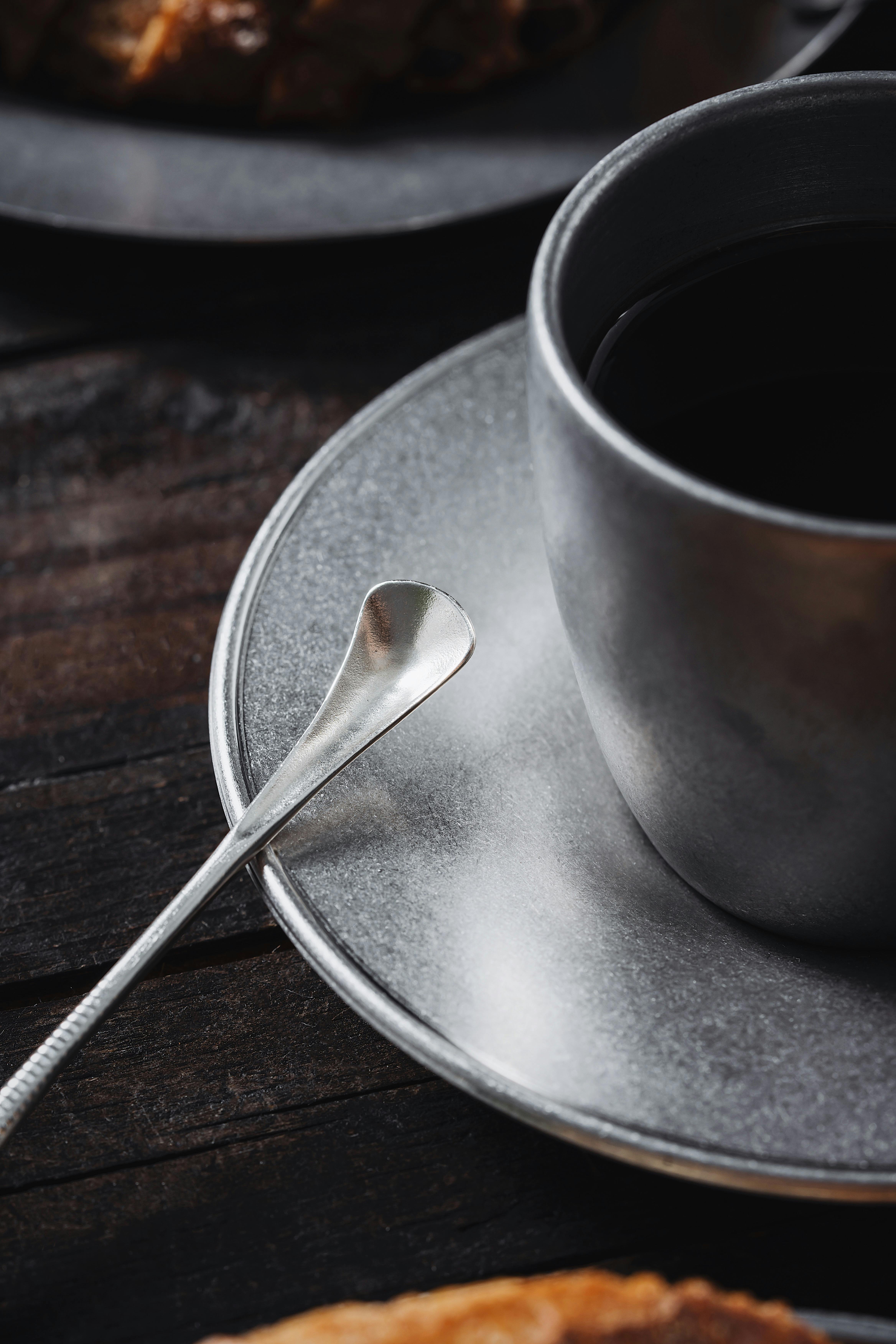 Silver Teaspoon and Coffee Cup on Table · Free Stock Photo