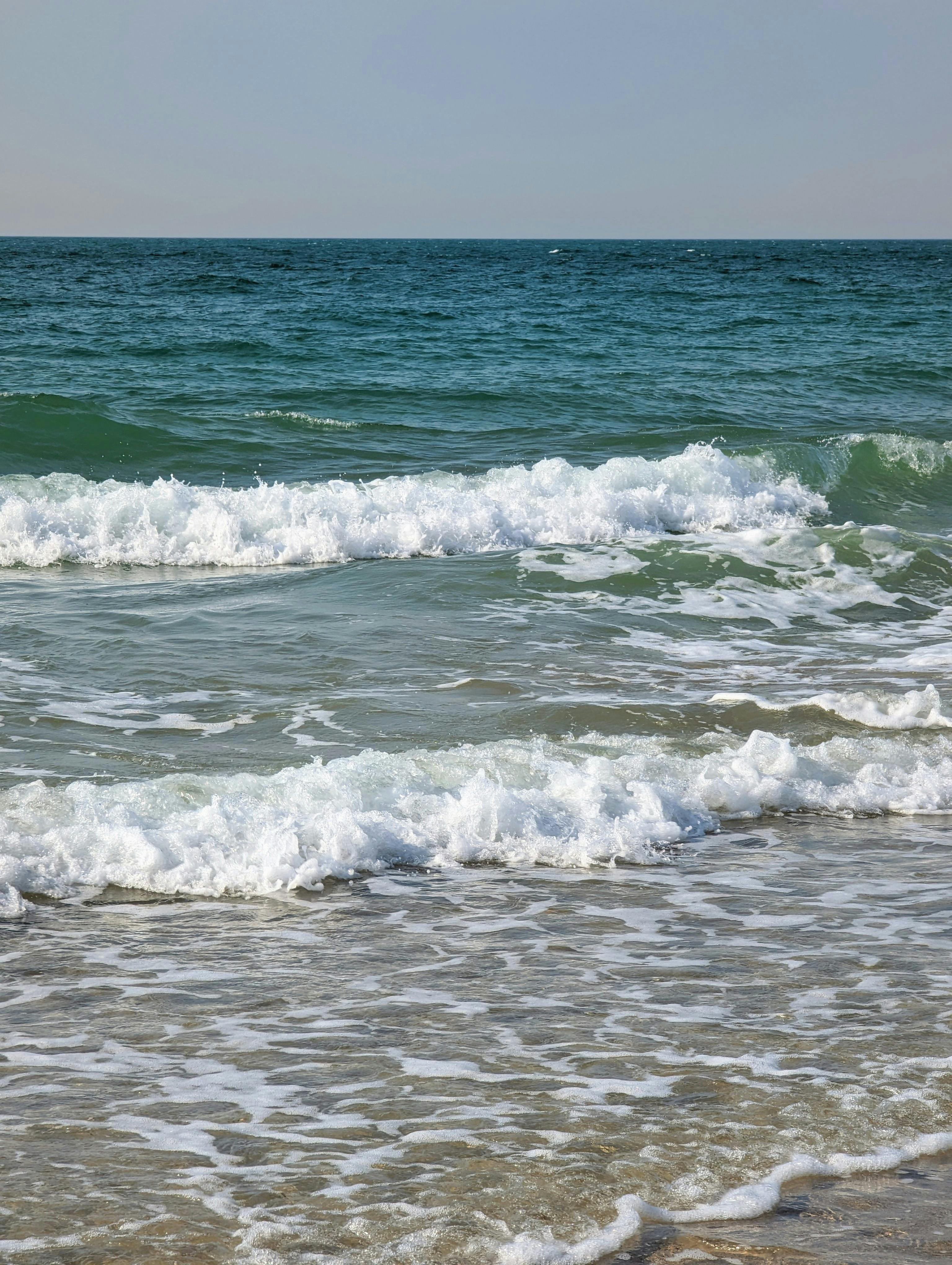 Sea Foam on Waves · Free Stock Photo