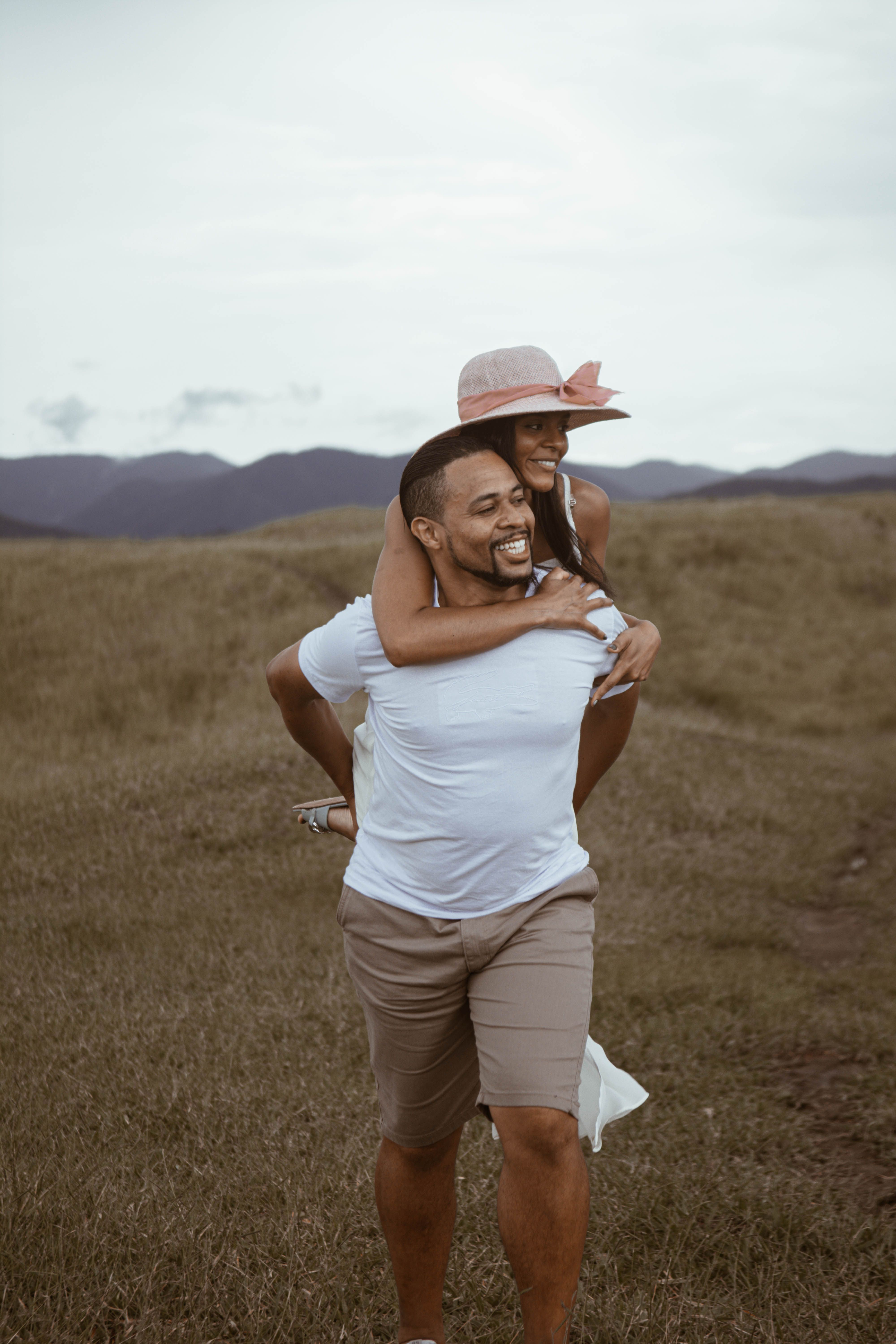 Man Carrying Piggyback Woman · Free Stock Photo