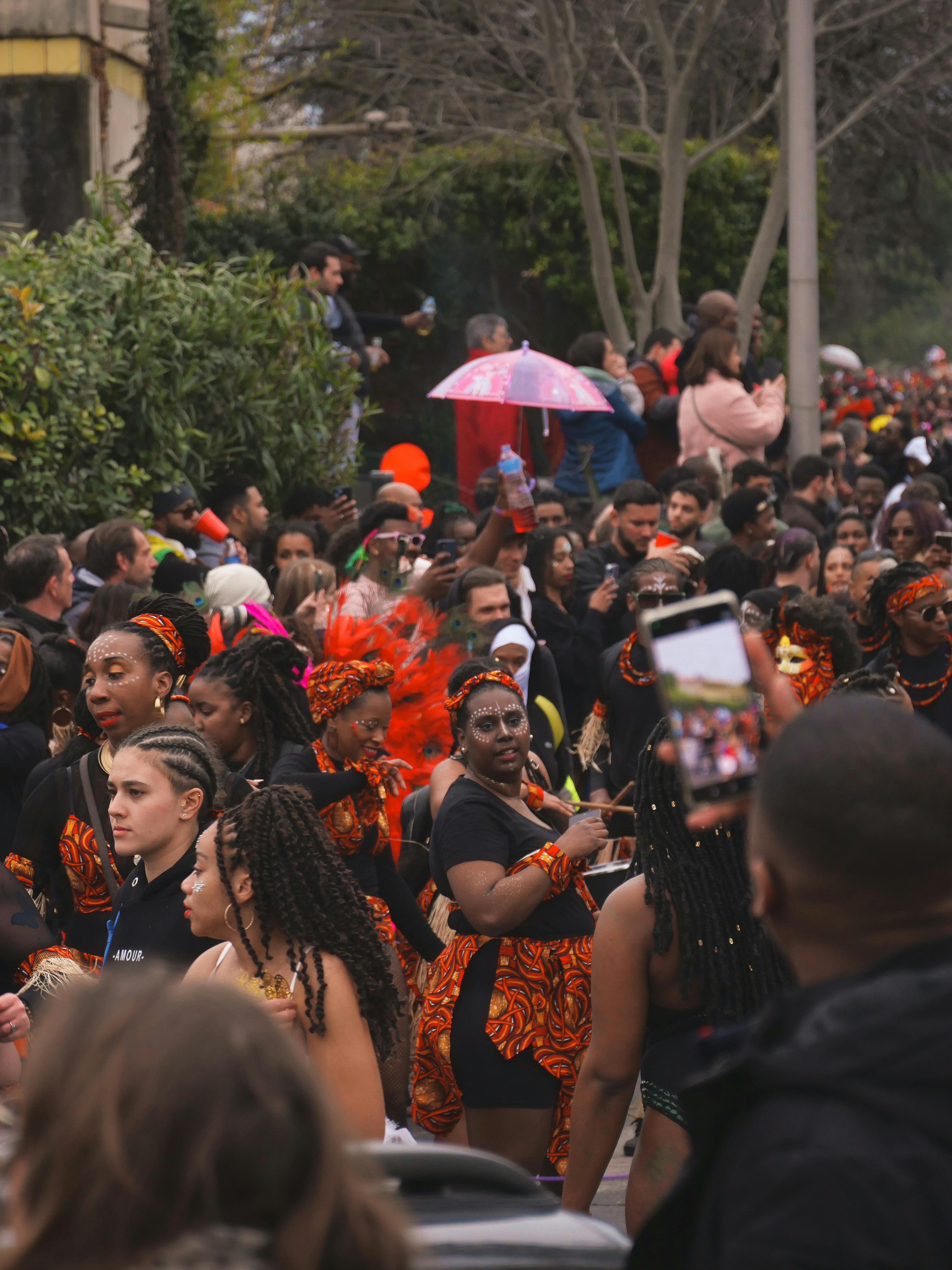 A Crowded Street during a Parade · Free Stock Photo
