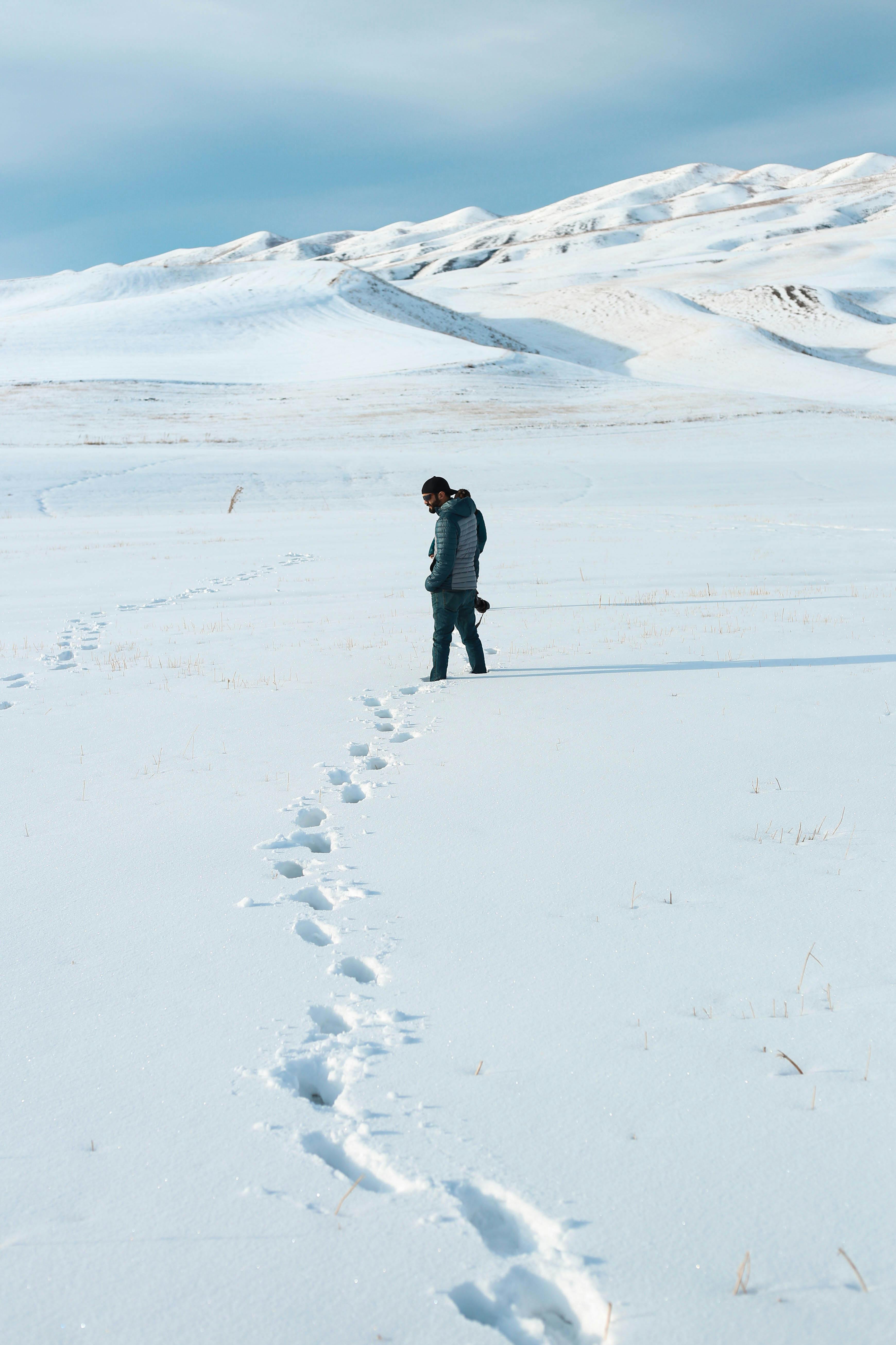 Man Standing on Snow Area · Free Stock Photo