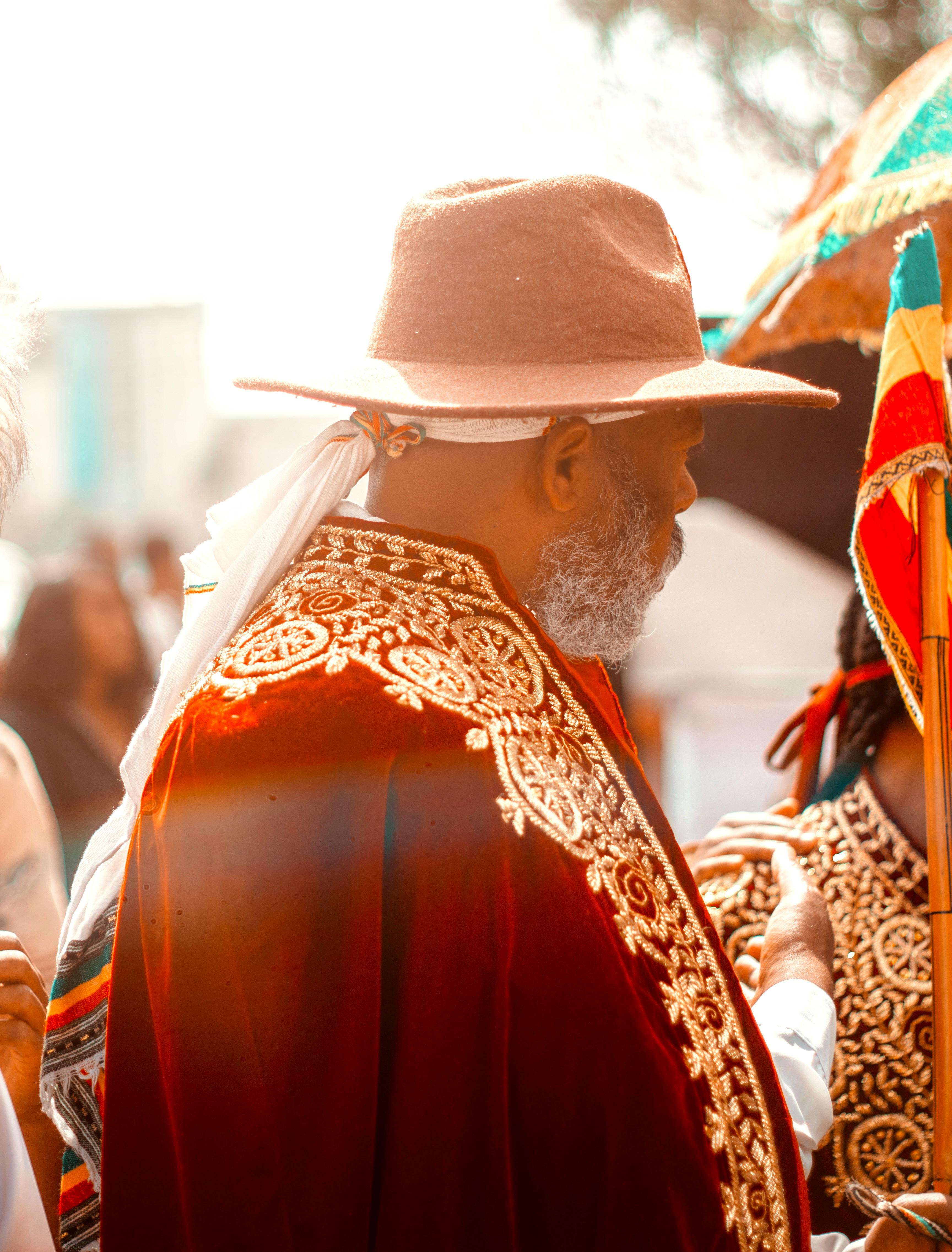 Elegant Elderly Man in Red Jacket · Free Stock Photo
