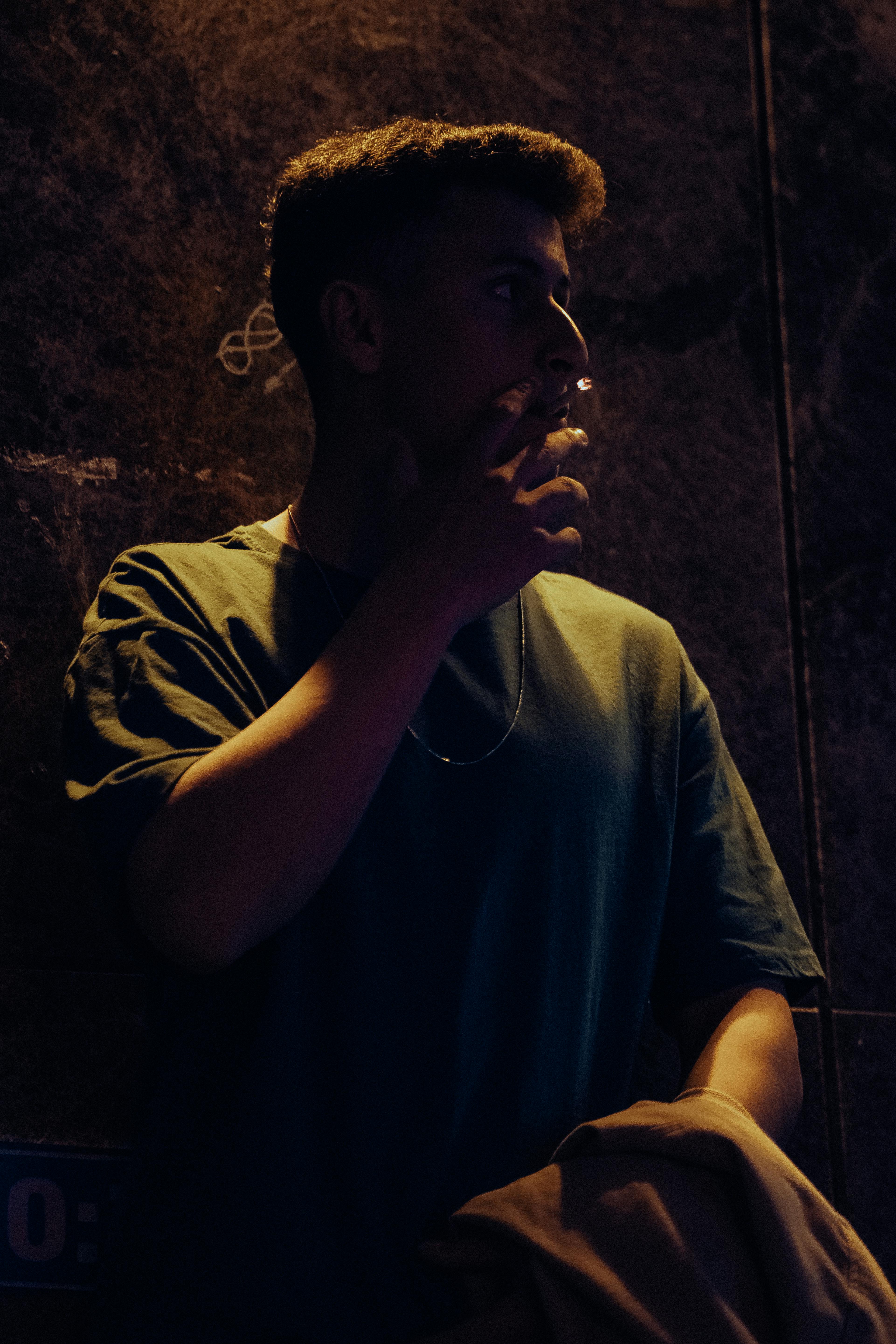 A Person Pressing a Doorbell · Free Stock Photo