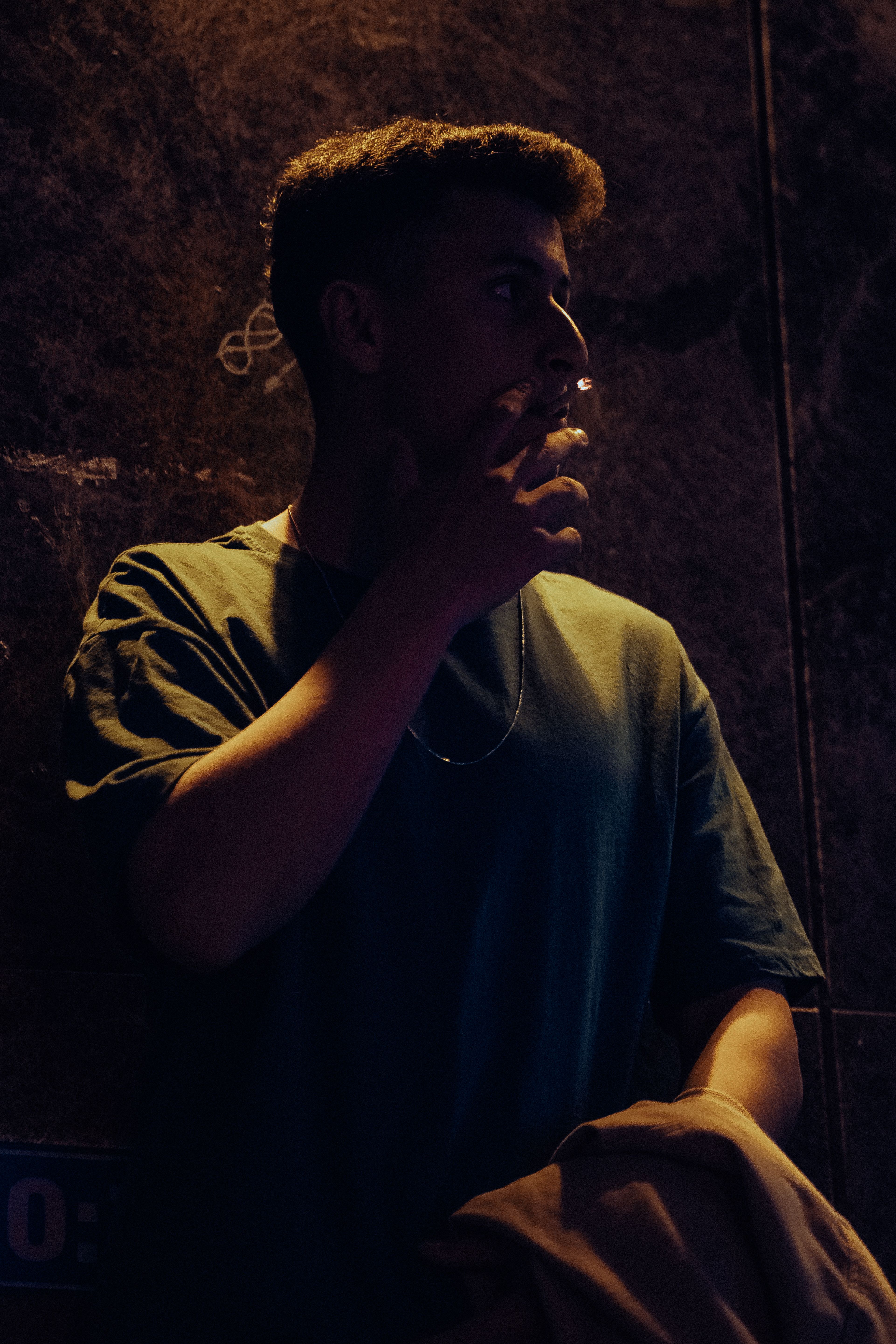Man with a Cigarette at Dusk · Free Stock Photo
