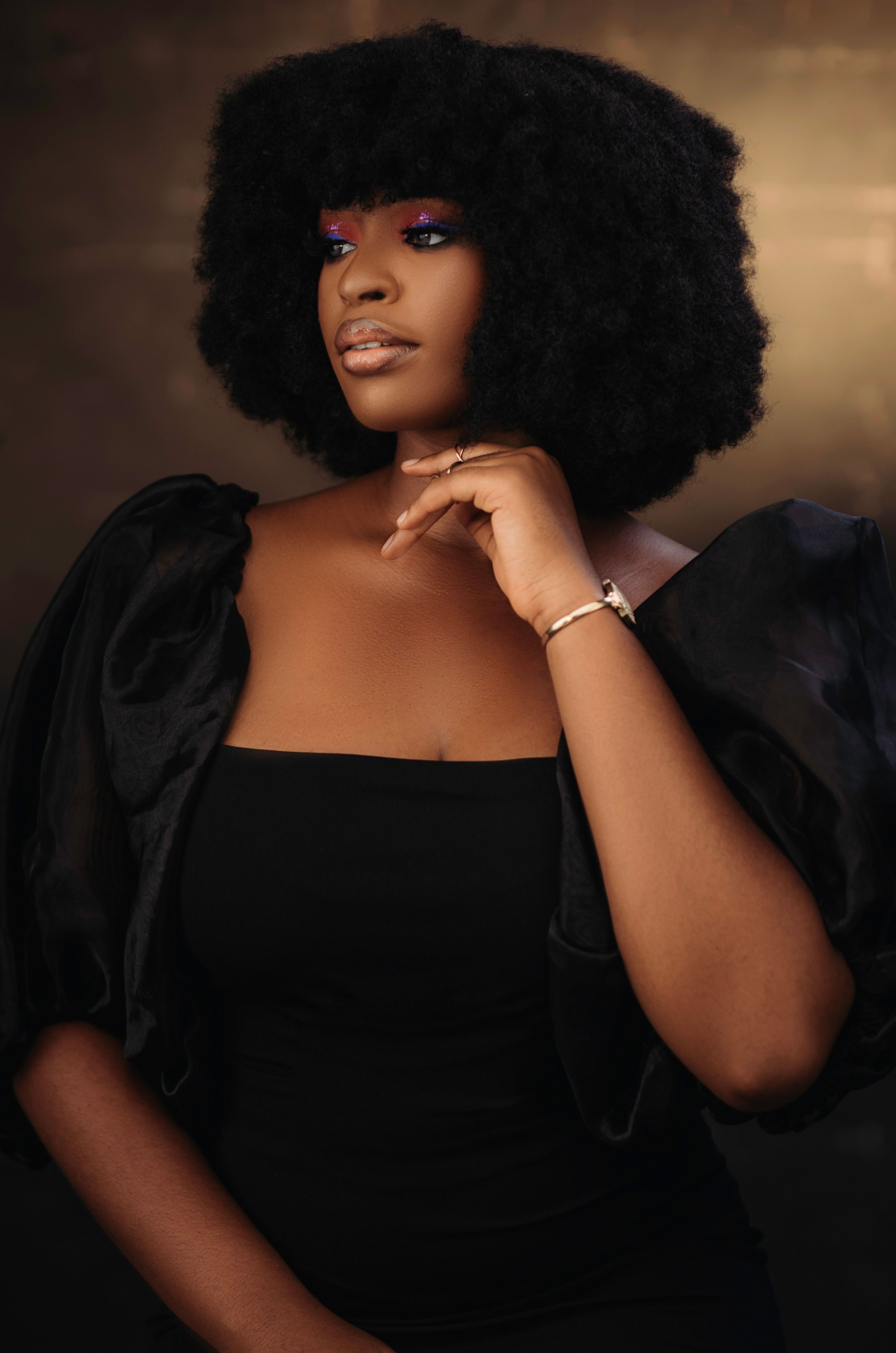 Portrait of an African Woman Wearing Pink Dress · Free Stock Photo