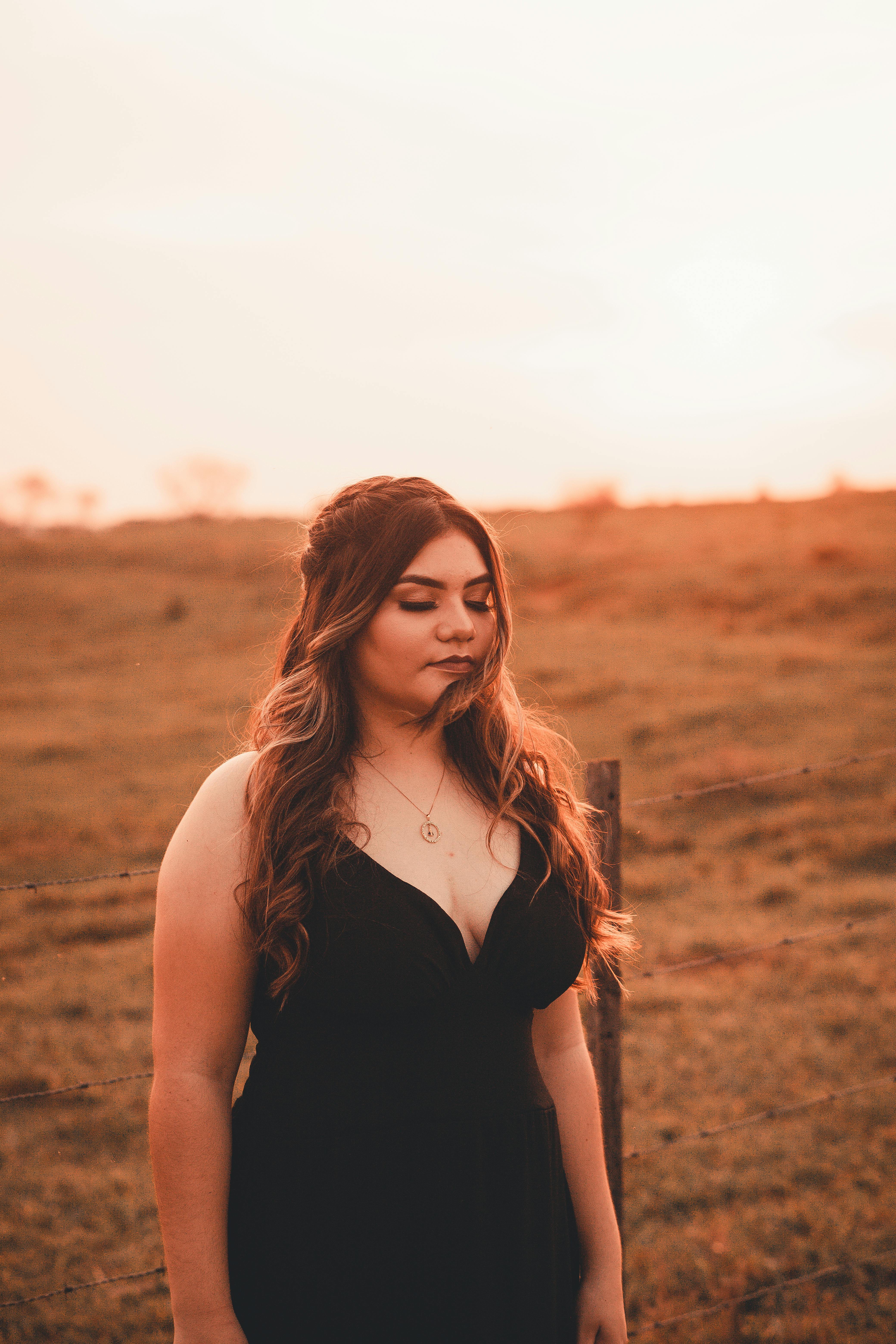 Plus Size Woman in Black Dress · Free Stock Photo