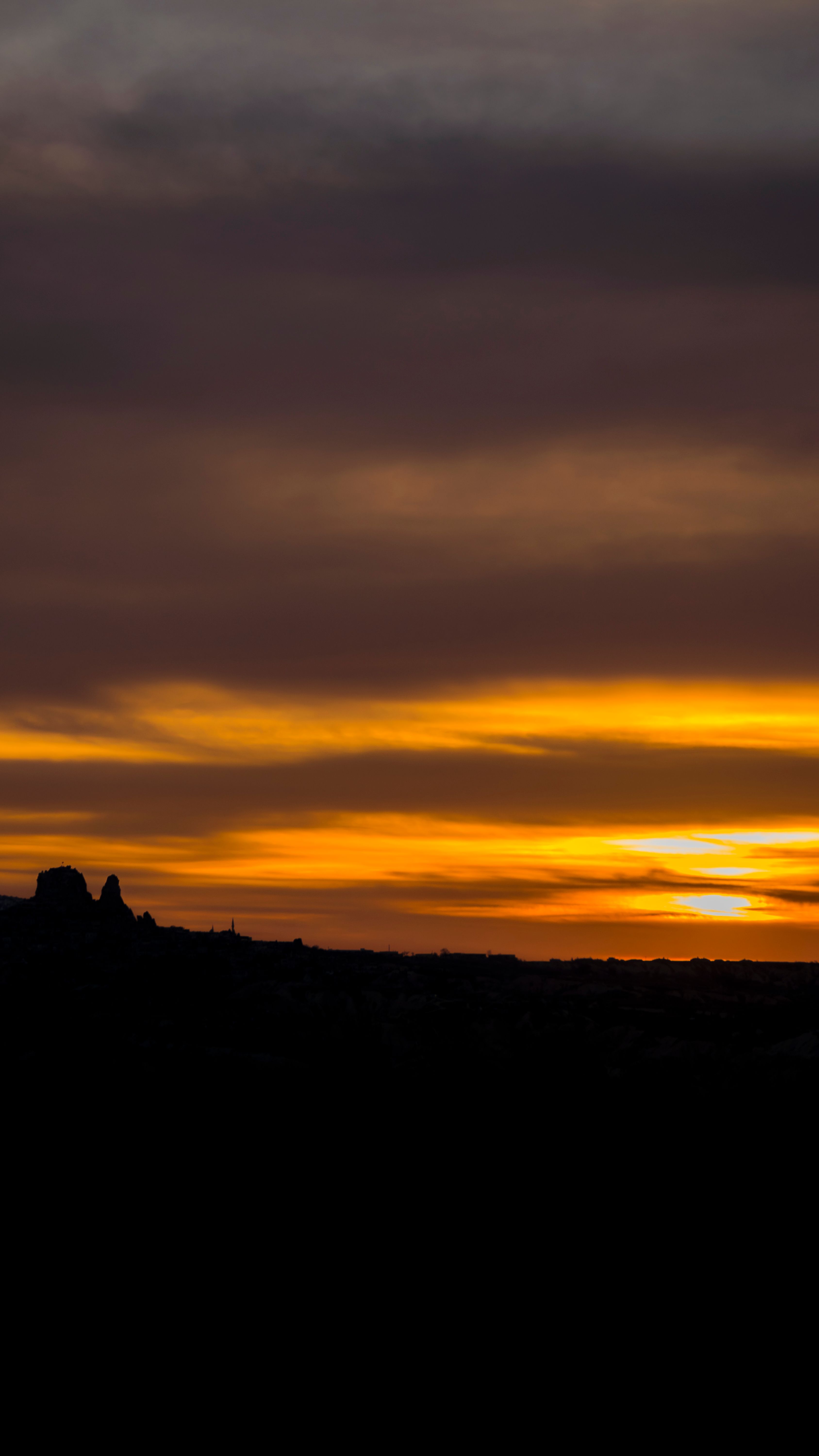 Black Mountain Range Against Sunset Sky · Free Stock Photo