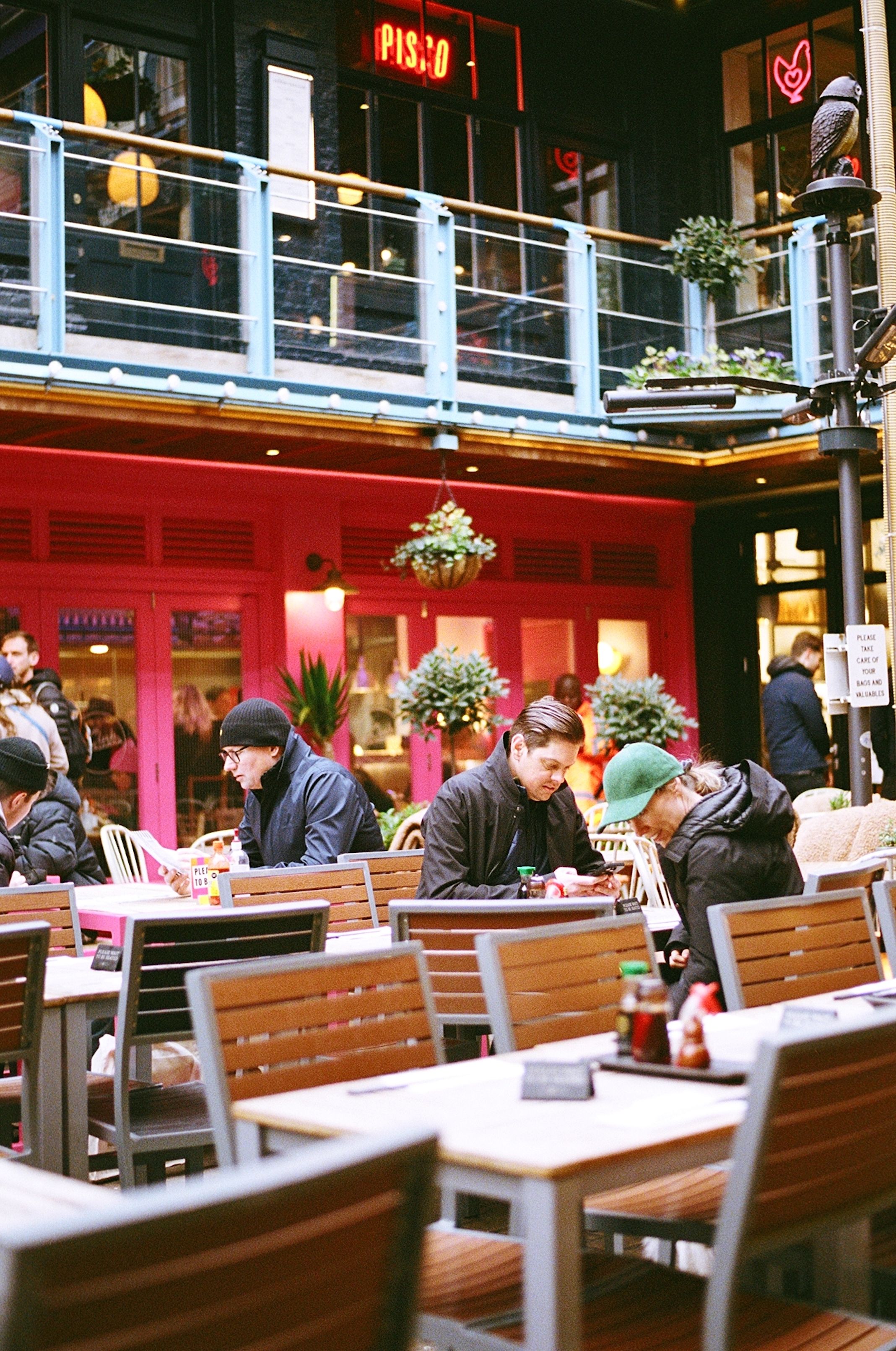 Customers Sitting at Restaurant Tables · Free Stock Photo