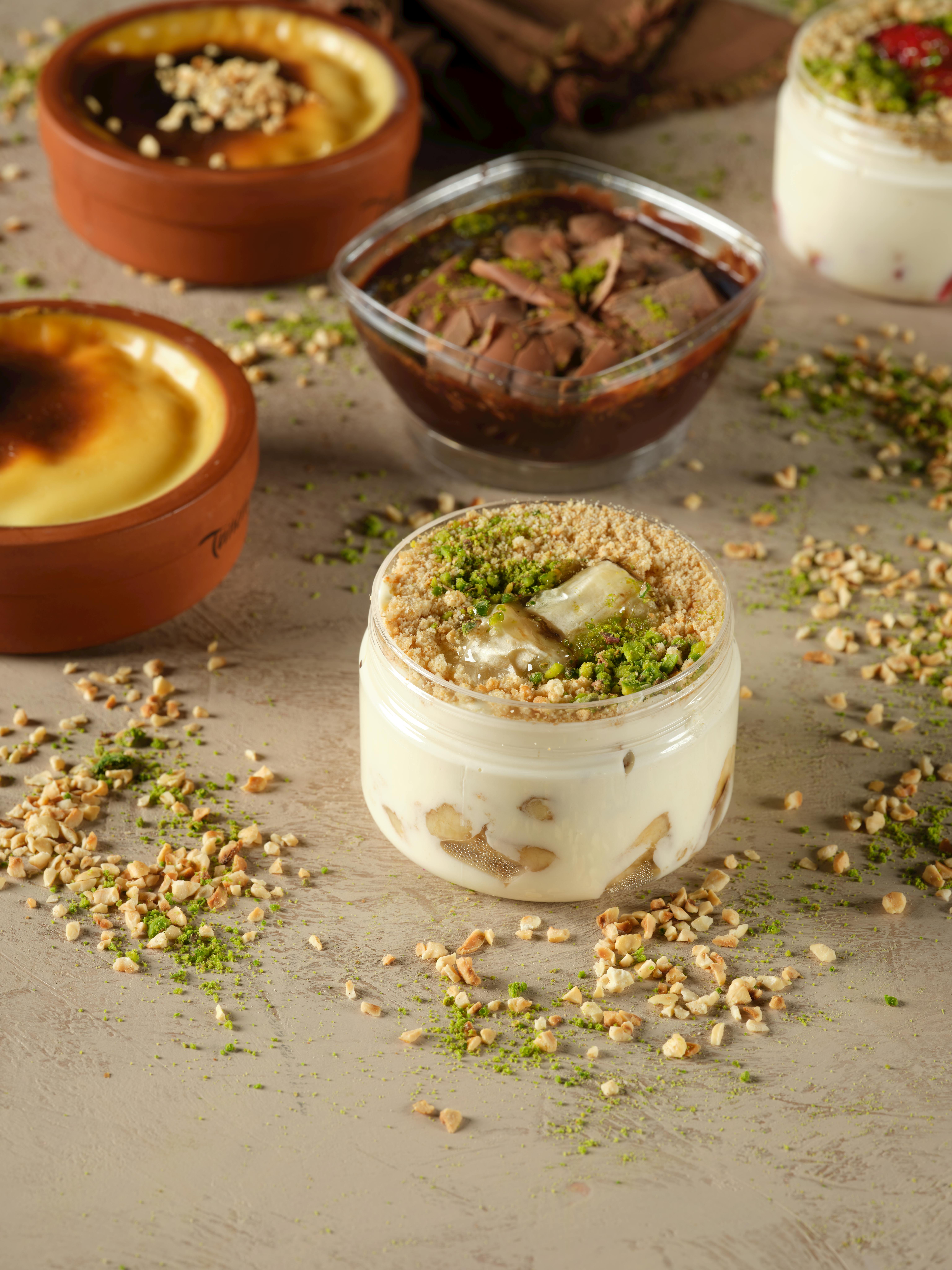 Traditional Turkish Puddings with Pistachios Sprinkle · Free Stock Photo