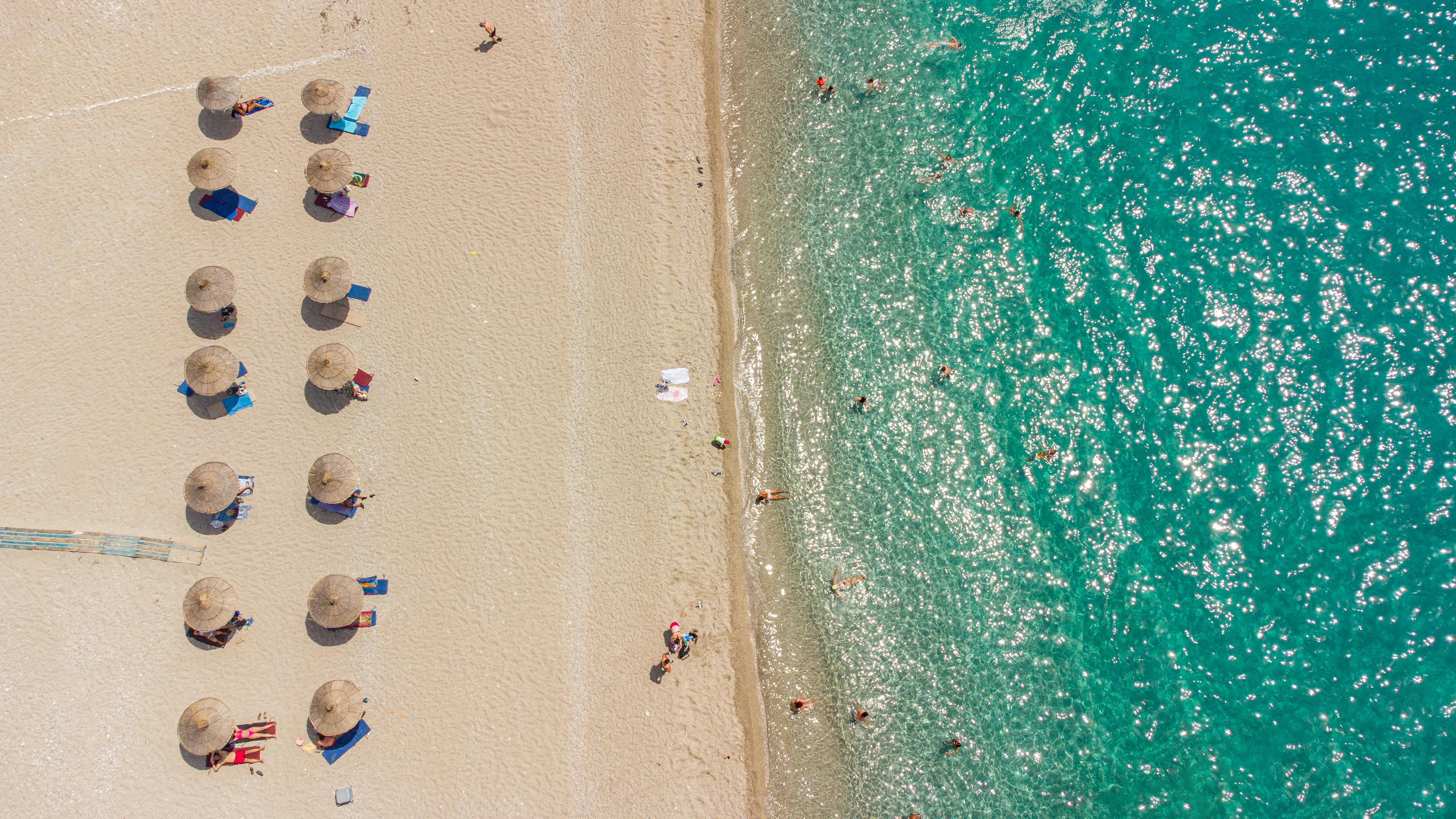 Sunbeds on a Sunny Beach · Free Stock Photo