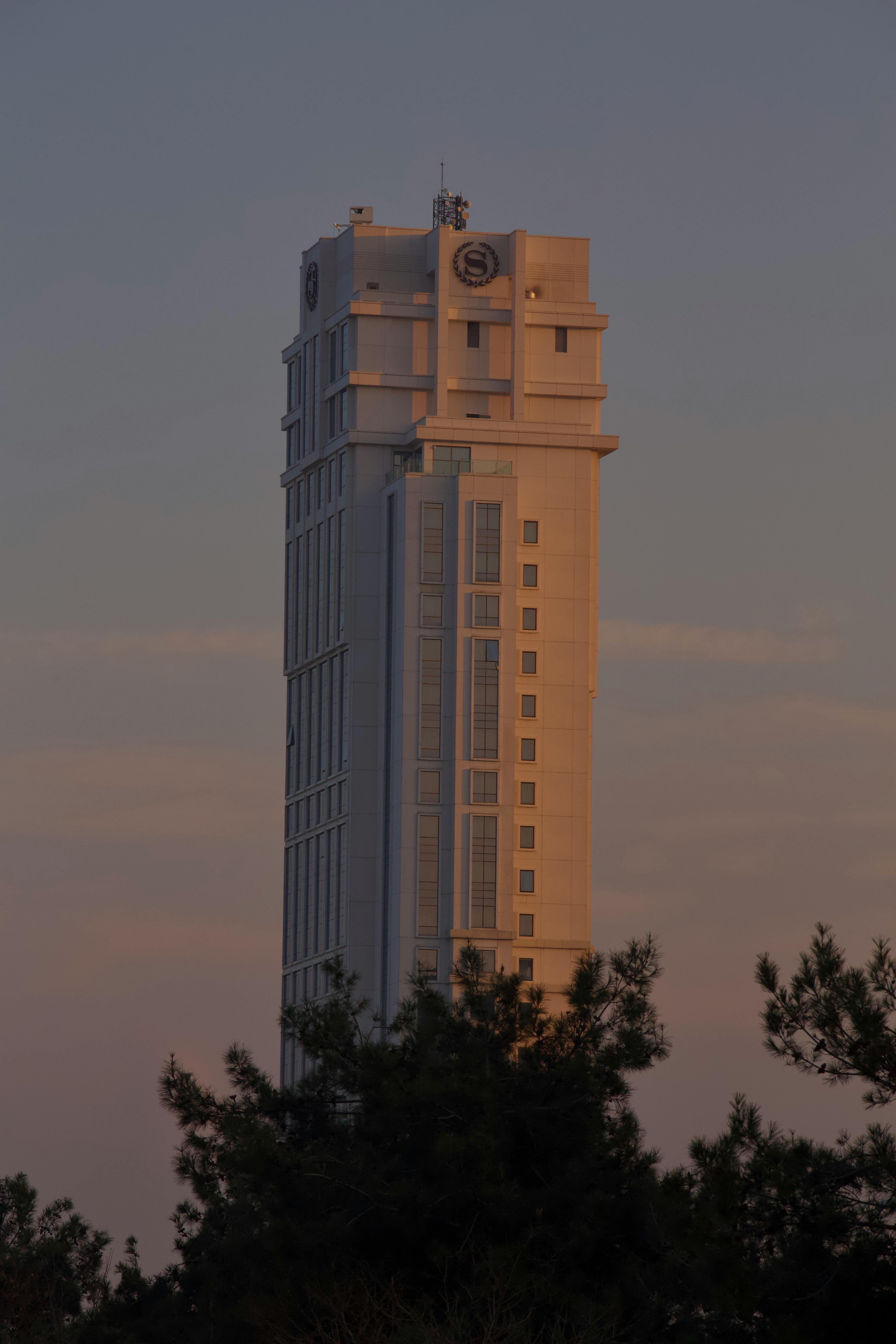 A Modern Skyscraper at Sunset · Free Stock Photo