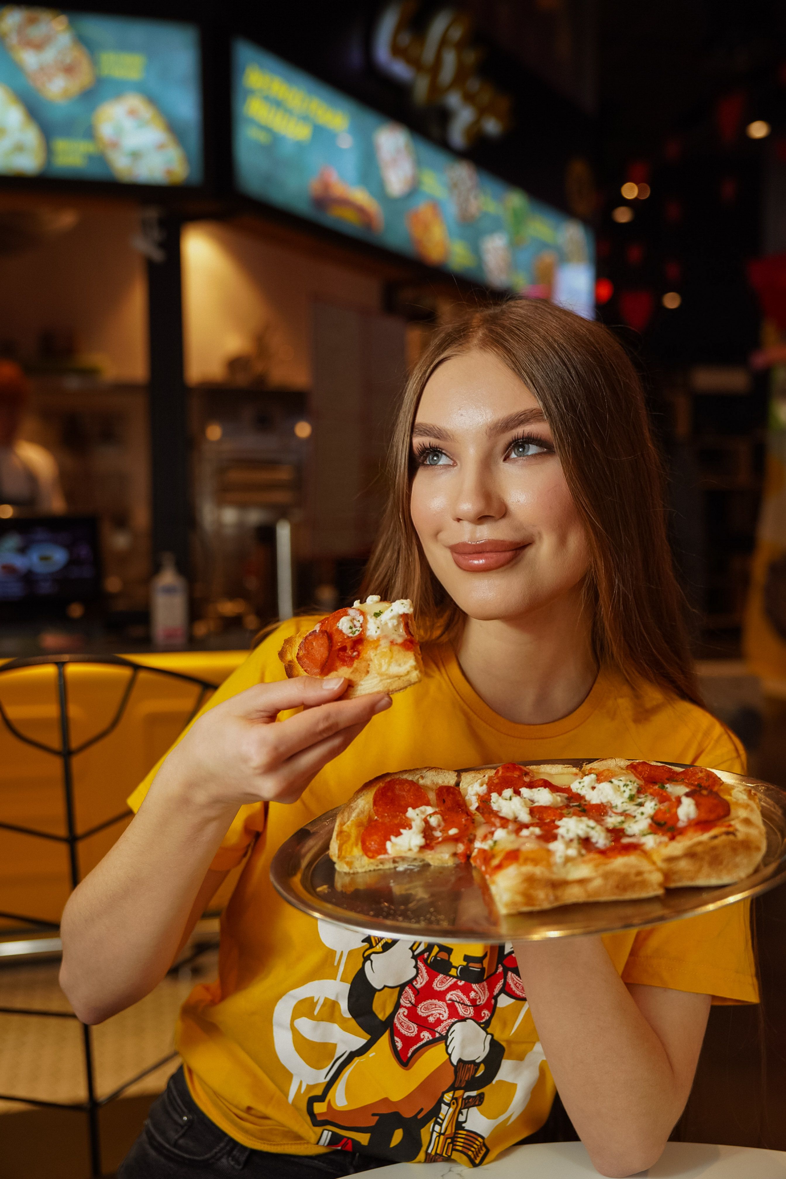 Green-haired Woman Eating Pizza · Free Stock Photo