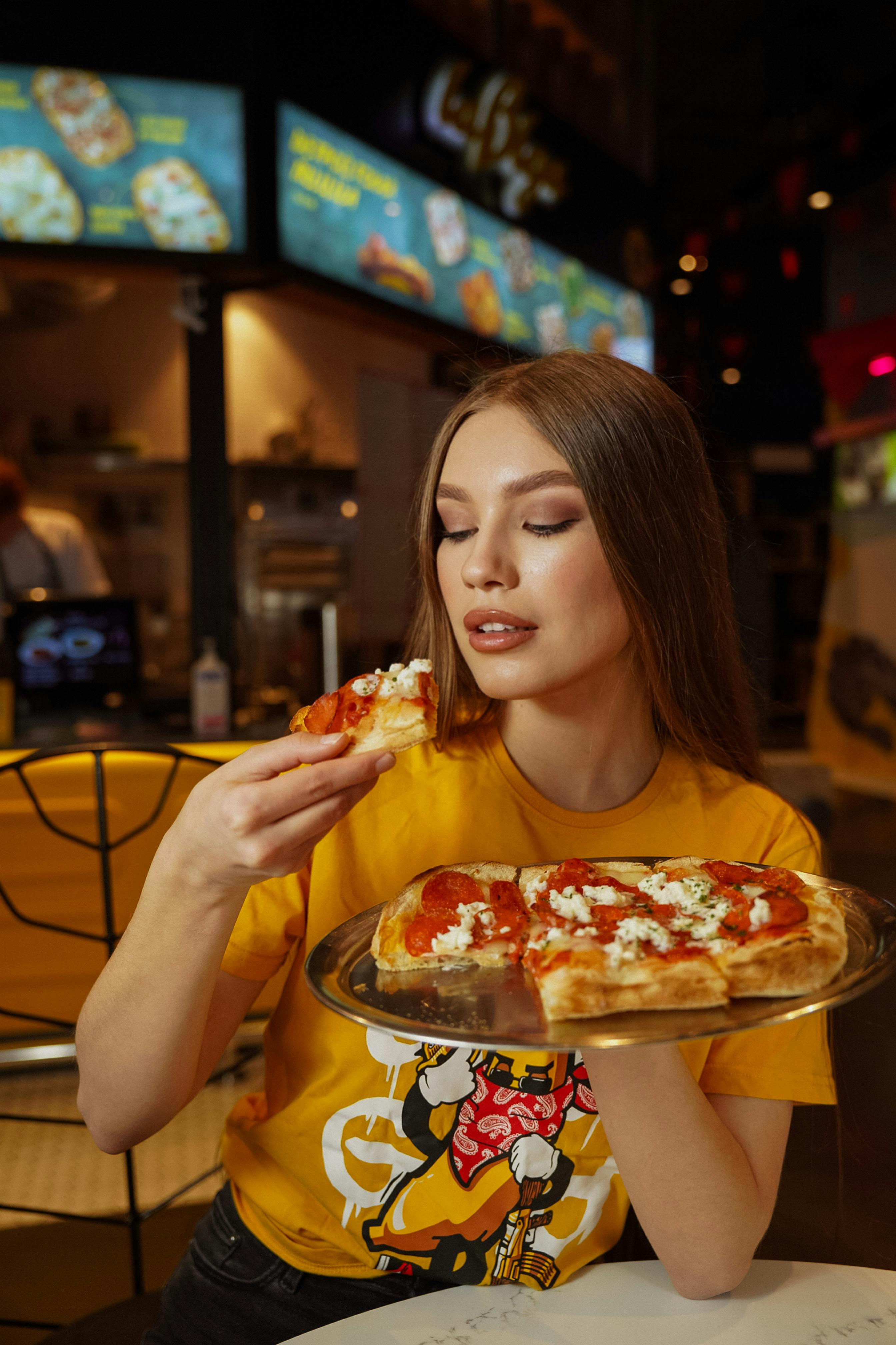 Green-haired Woman Eating Pizza · Free Stock Photo