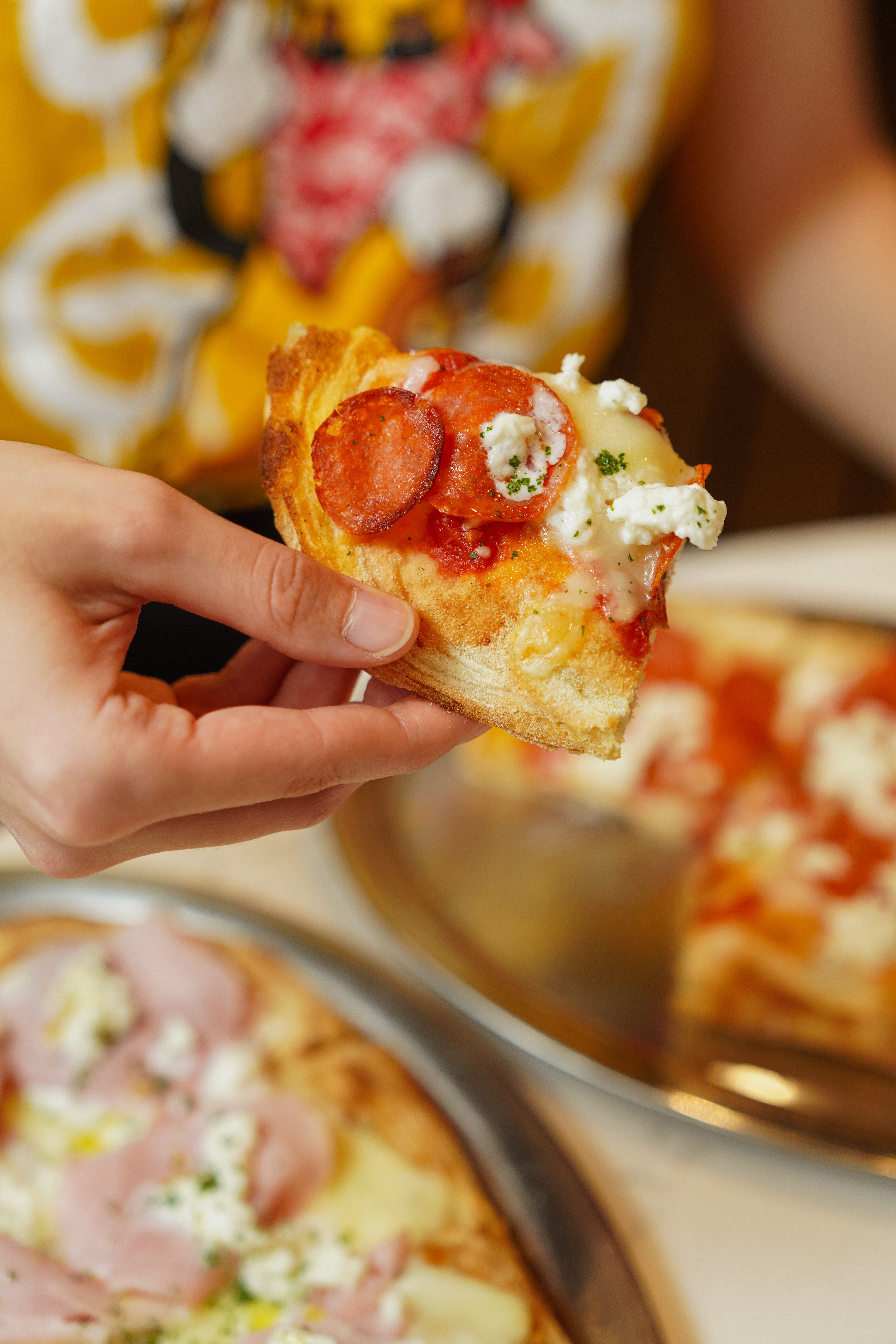 Pizza Slice in Hand · Free Stock Photo