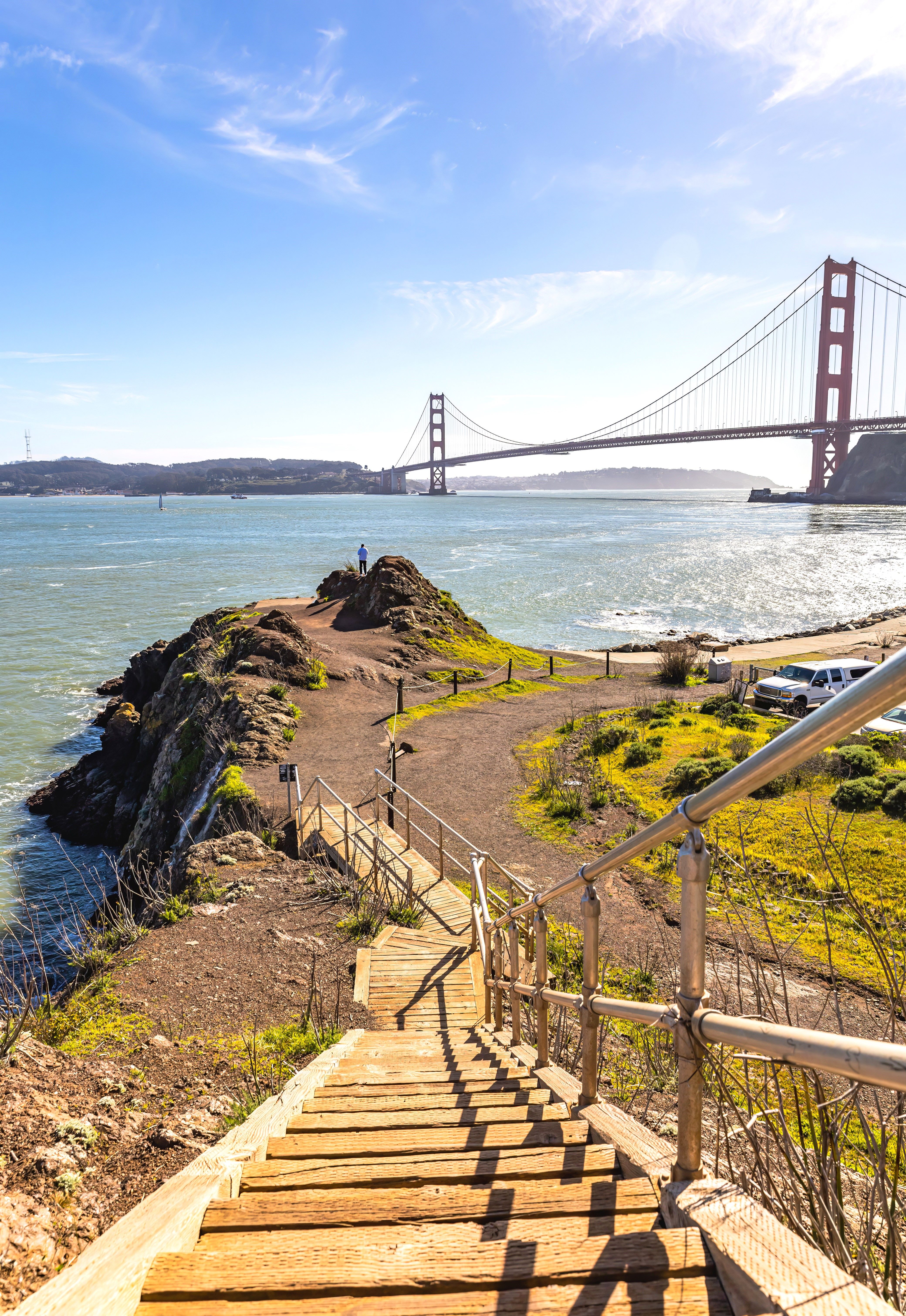 Stairs to Sea Shore with Golden Gate Bridge behind · Free Stock Photo
