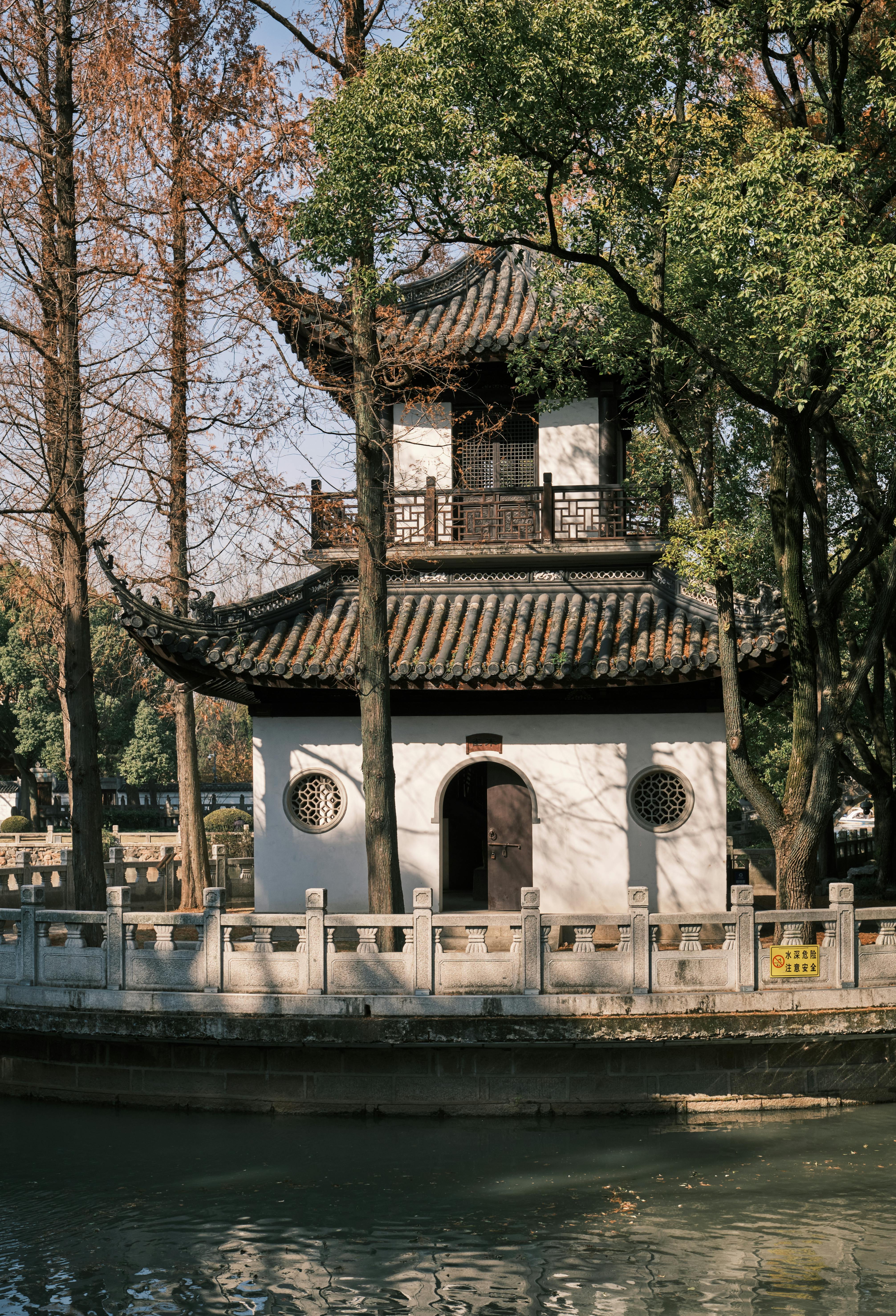 Shrine Building near Water · Free Stock Photo