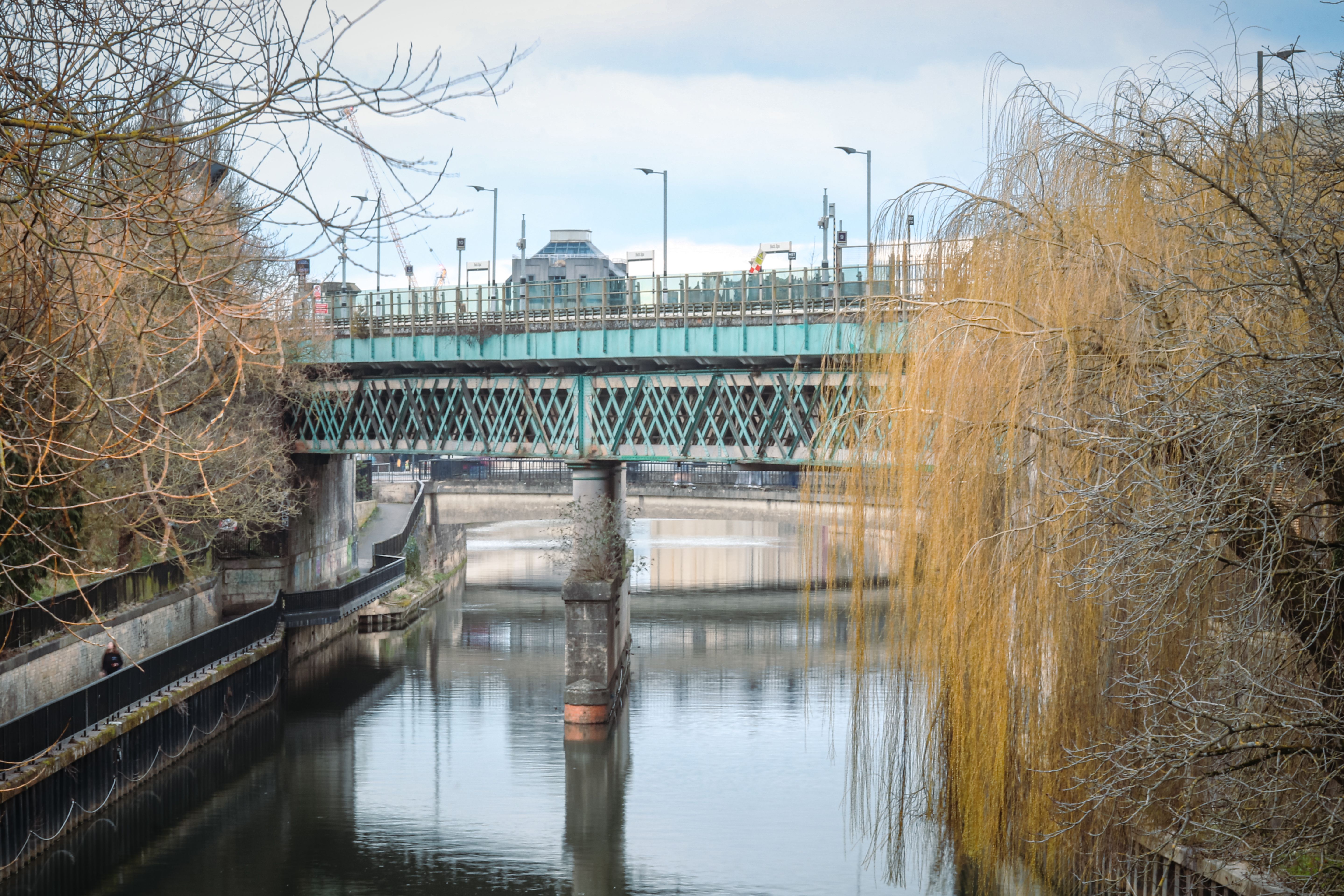 A Metal Bridge over the River in City · Free Stock Photo