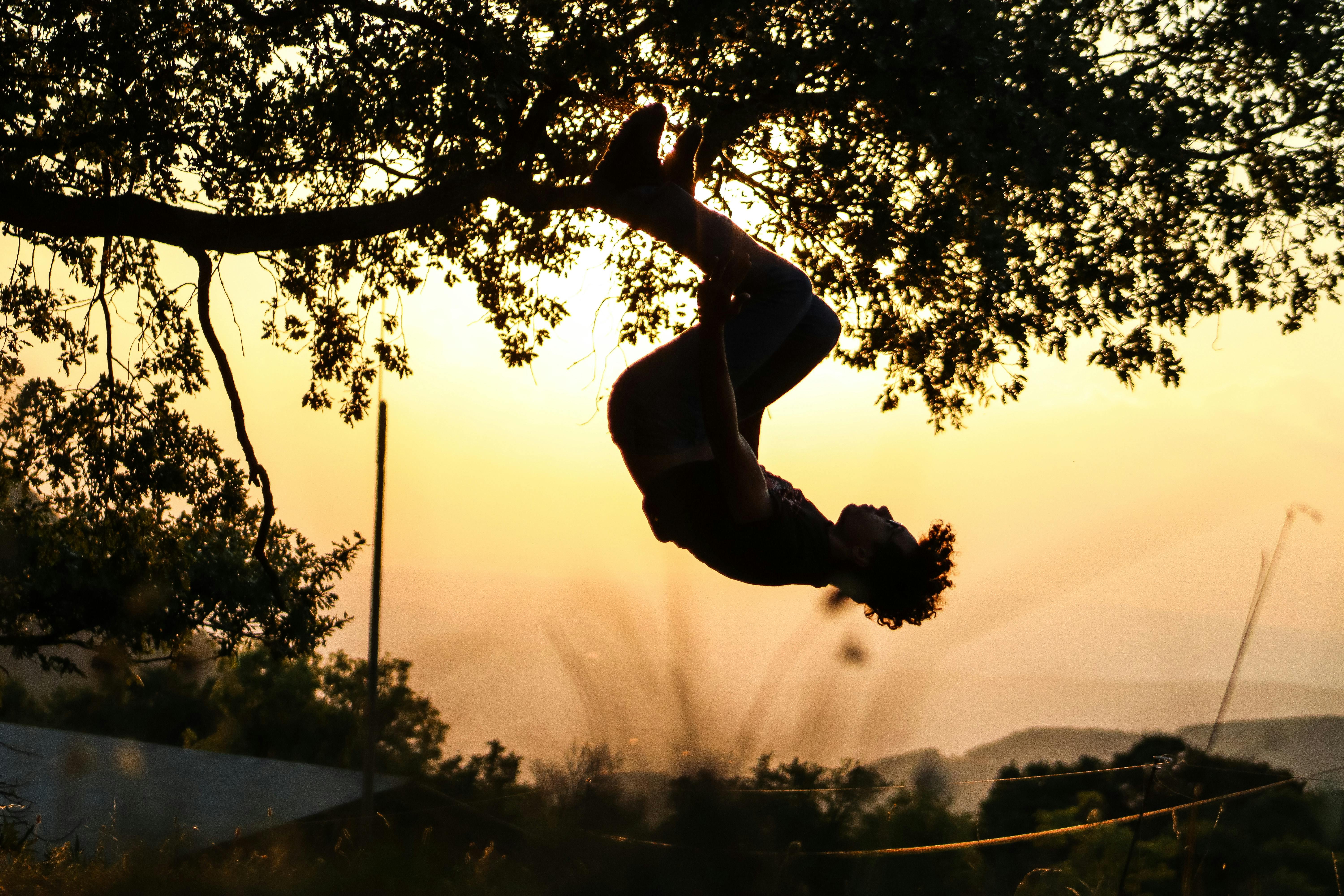 Man Back Flipping at Dusk · Free Stock Photo
