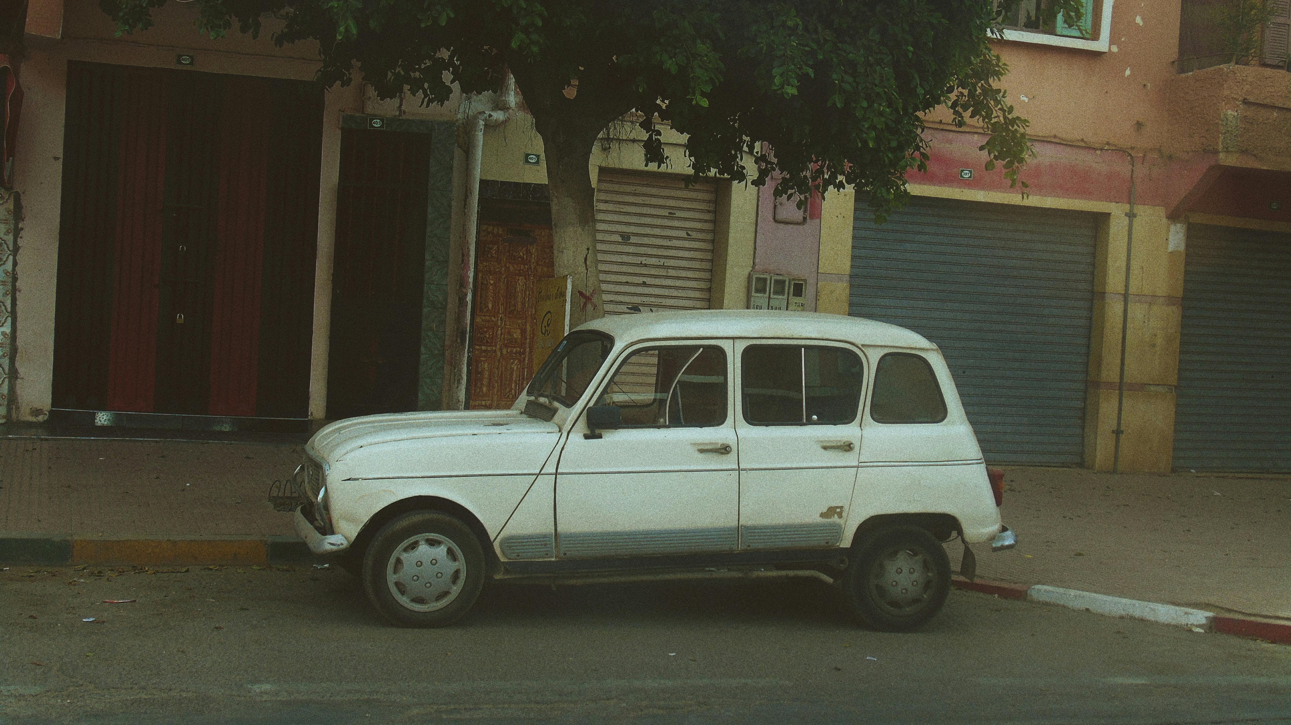 Two Beige and Teal Motor Scooters on Street · Free Stock Photo