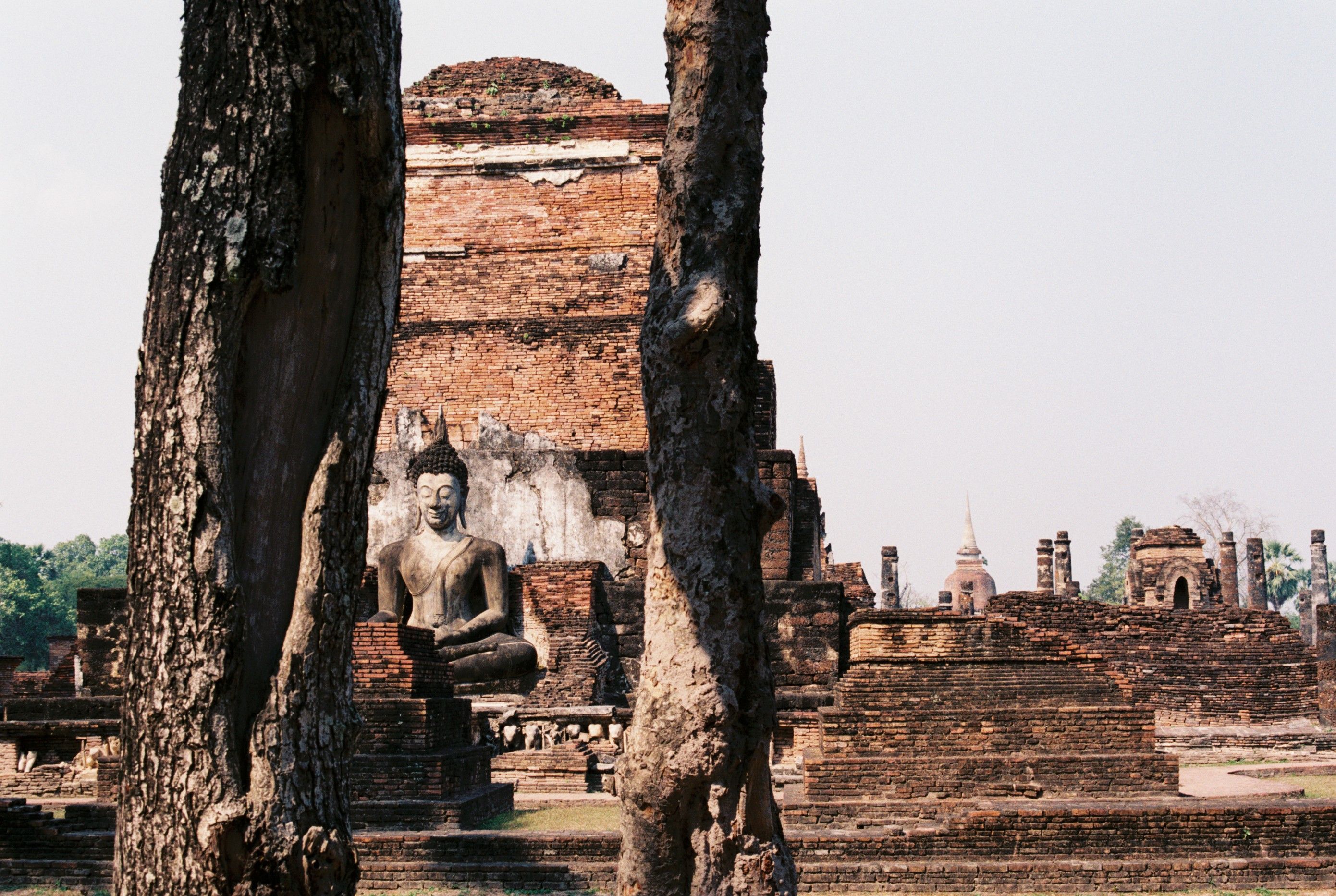 View of a Statue in front of Ruins of a Temple · Free Stock Photo