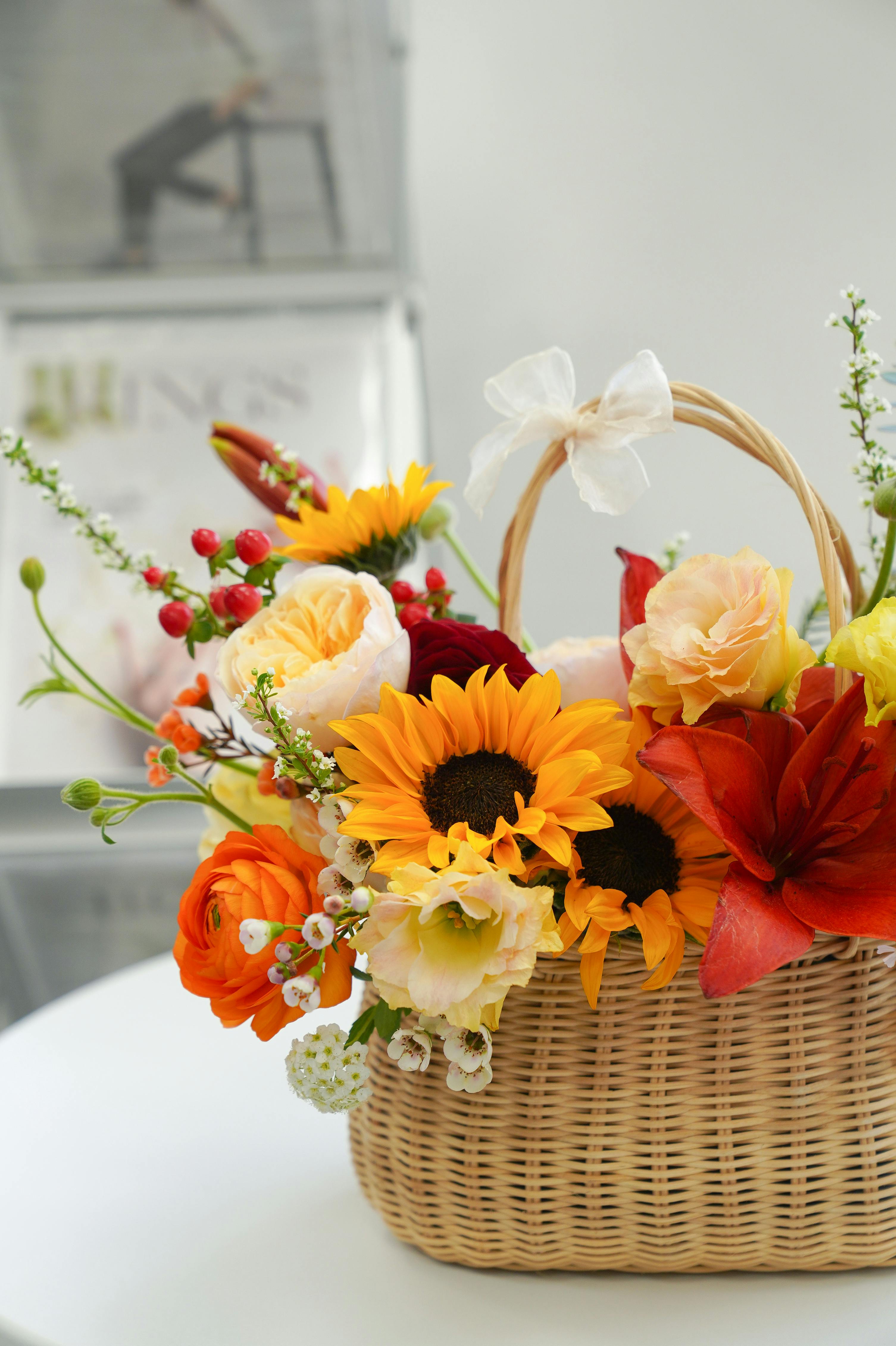 Colorful Flowers in Basket · Free Stock Photo