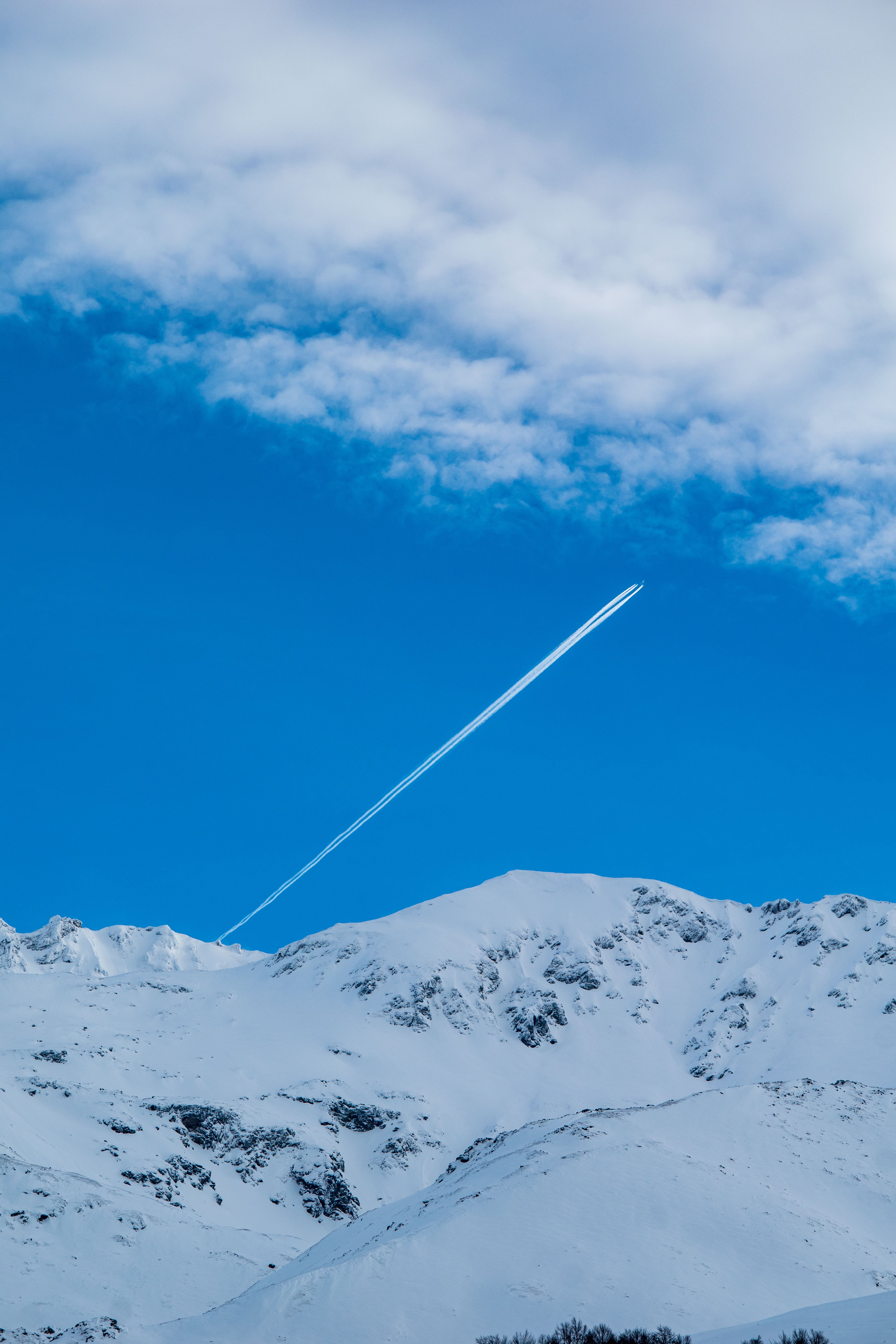 Airplane on Snow Covered Ground Near Snow Covered Mountains · Free ...