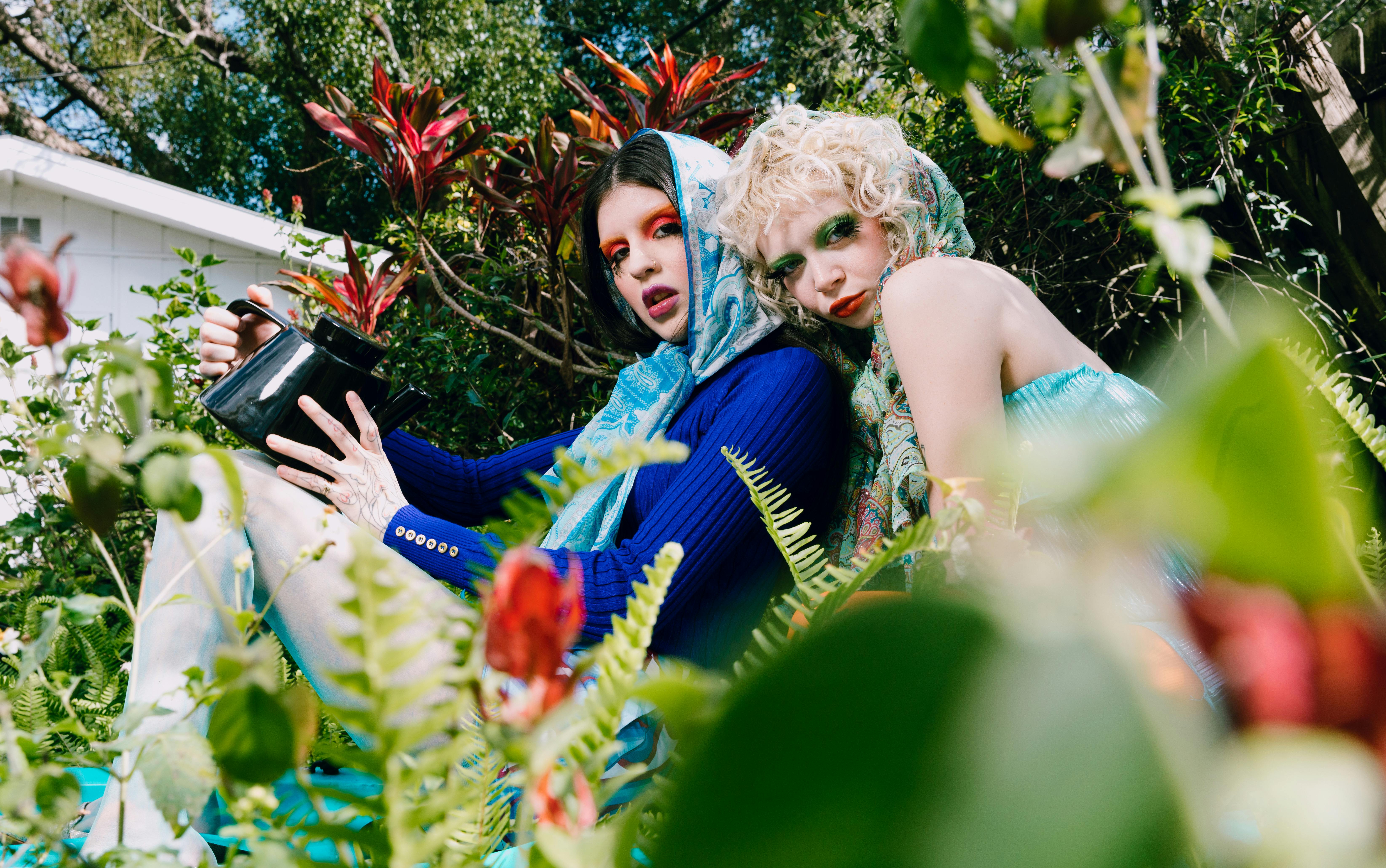 Women Posing in a Garden · Free Stock Photo