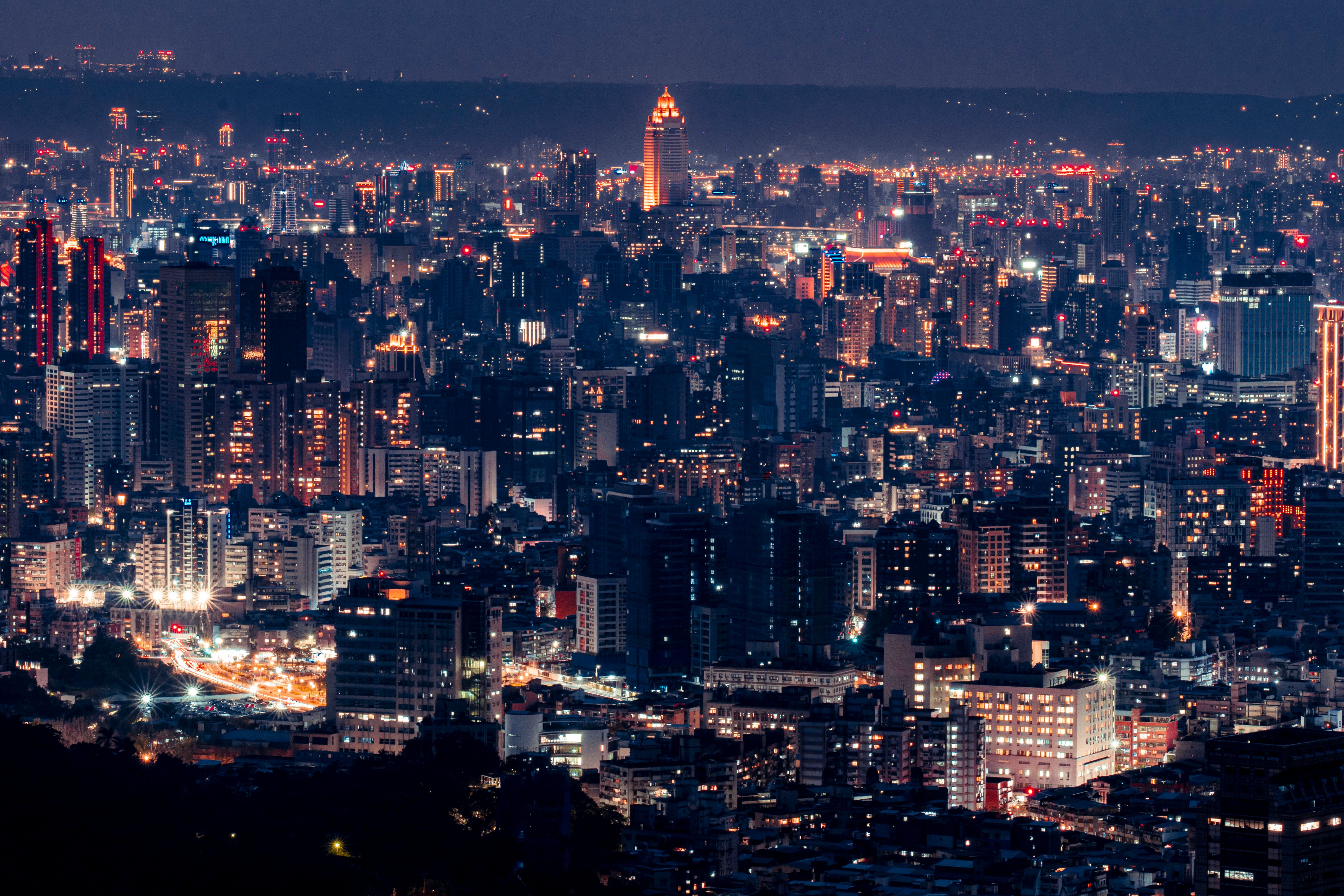 Illuminated Cityscape at Night · Free Stock Photo