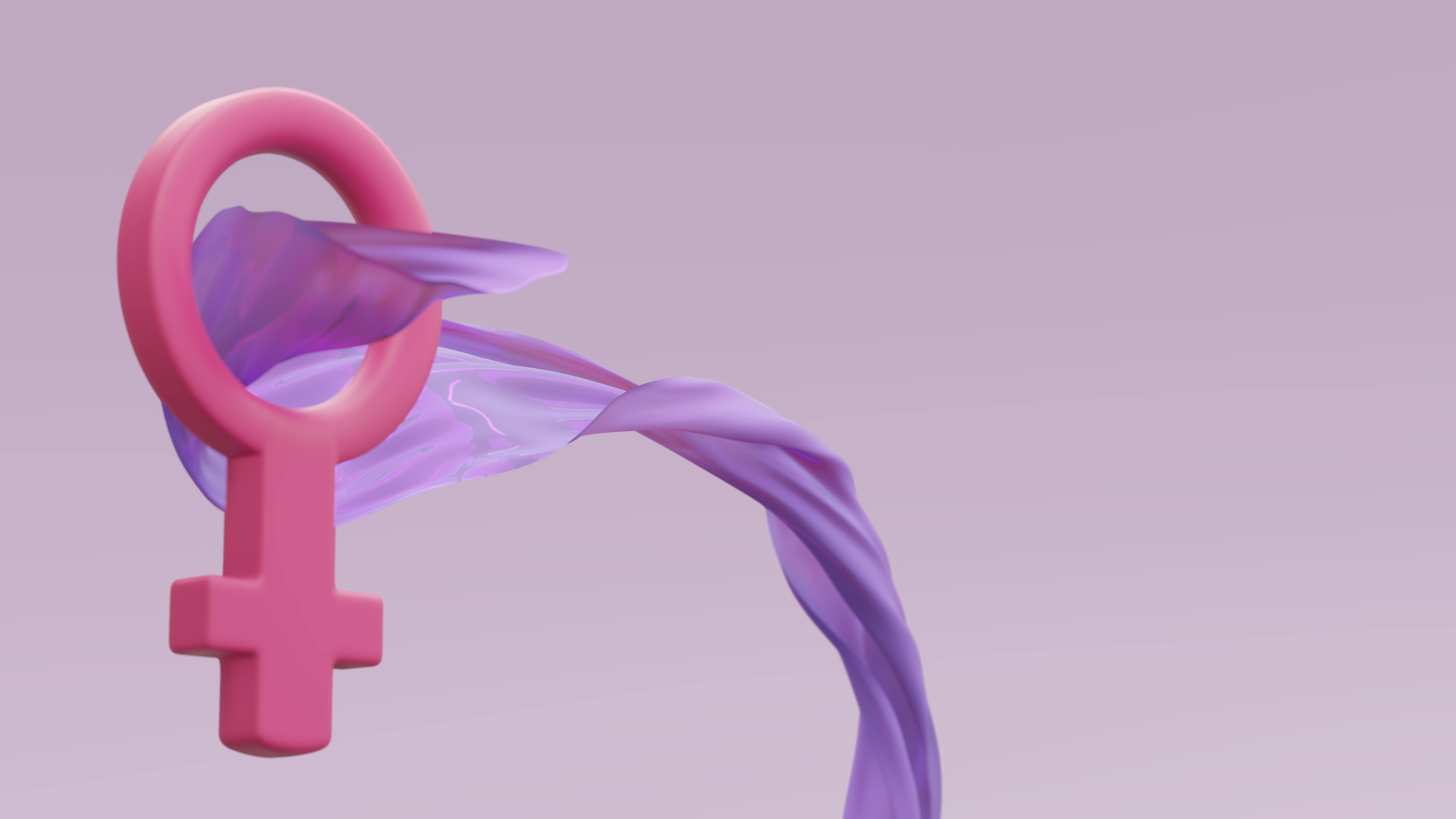 A pink female symbol with a purple ribbon · Free Stock Photo