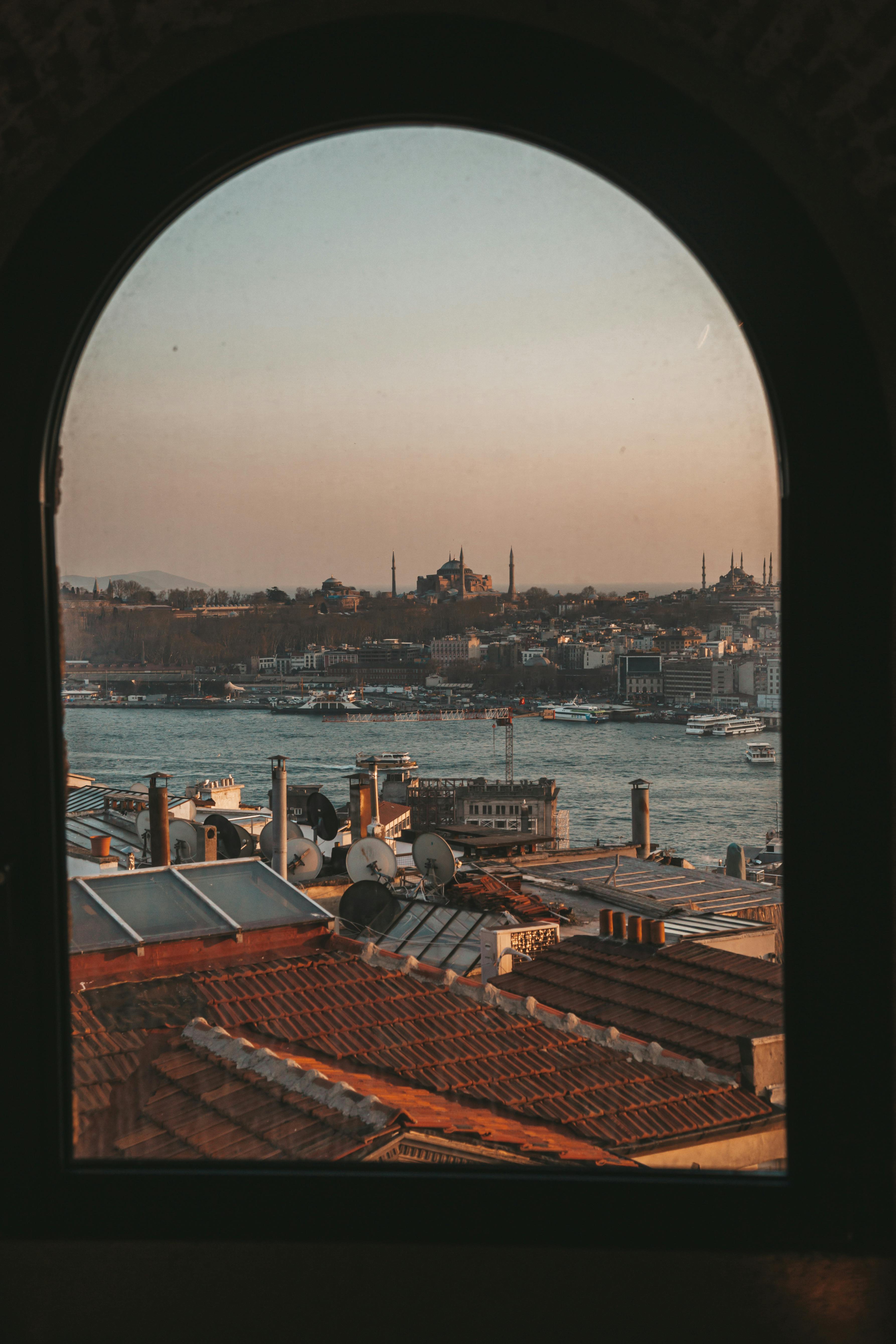 View of Istanbul at Sunset from an Arched Window · Free Stock Photo