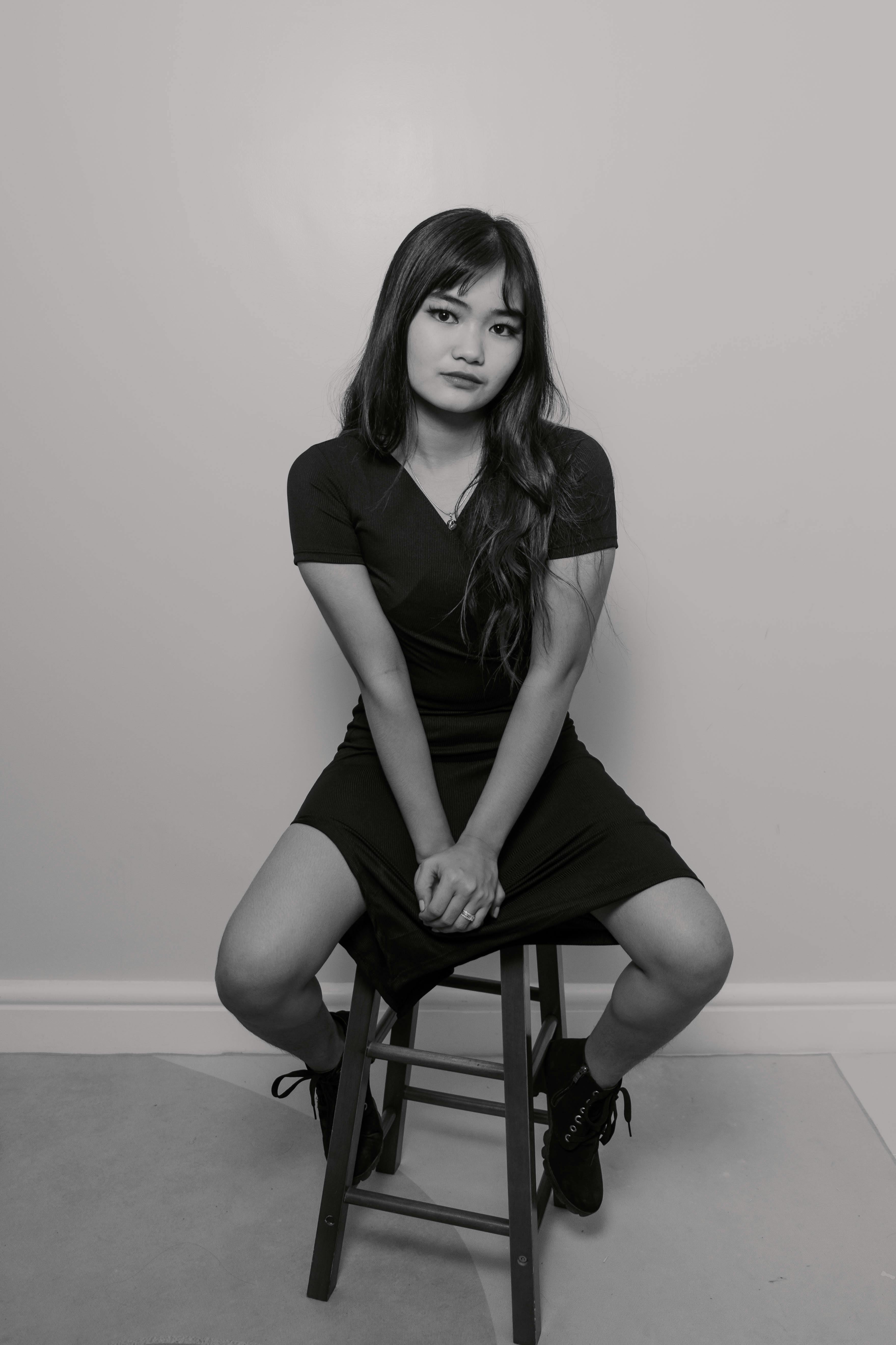 Woman Sitting on Stool · Free Stock Photo