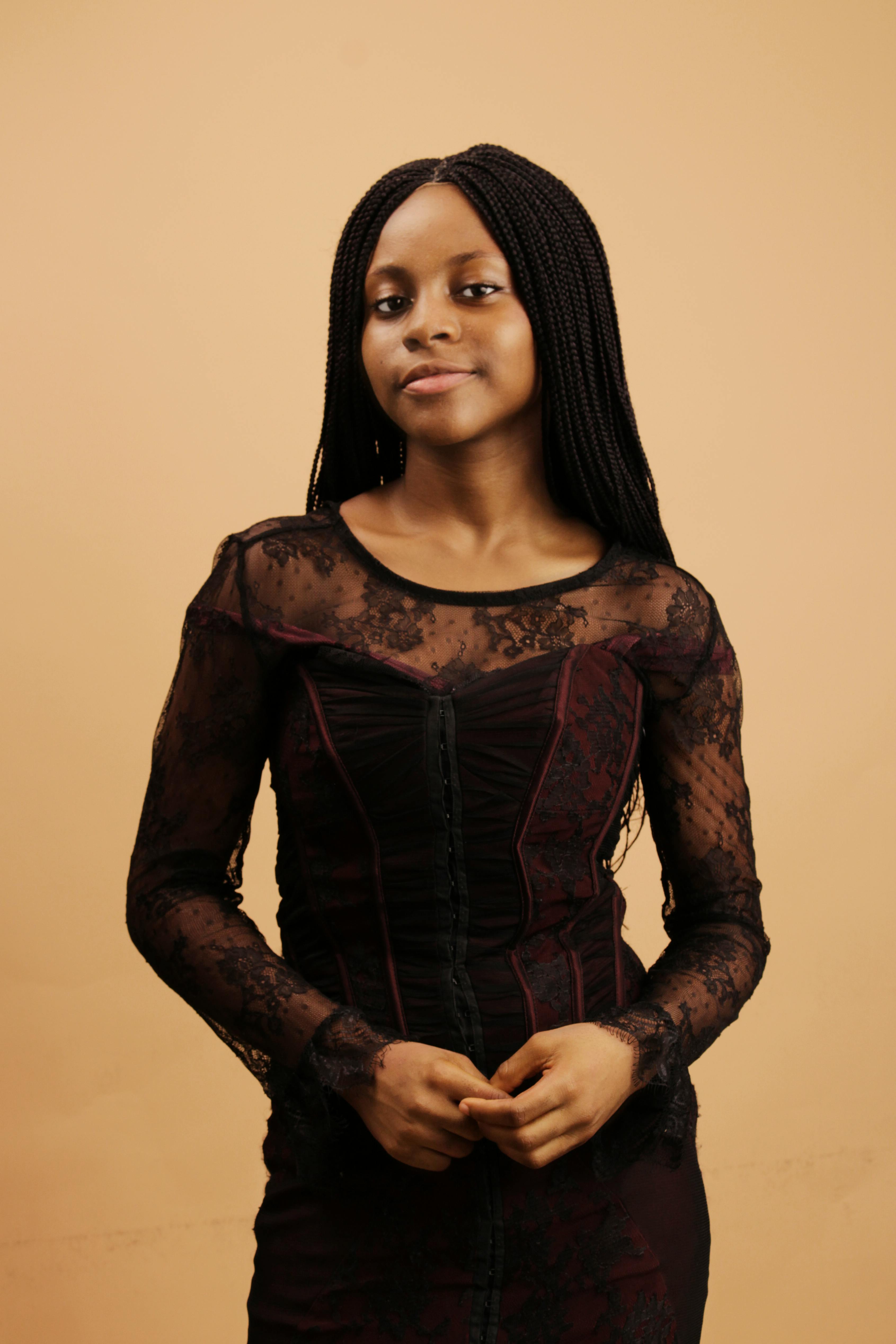 Portrait of a Pretty Brunette Wearing a Translucent Top · Free Stock Photo