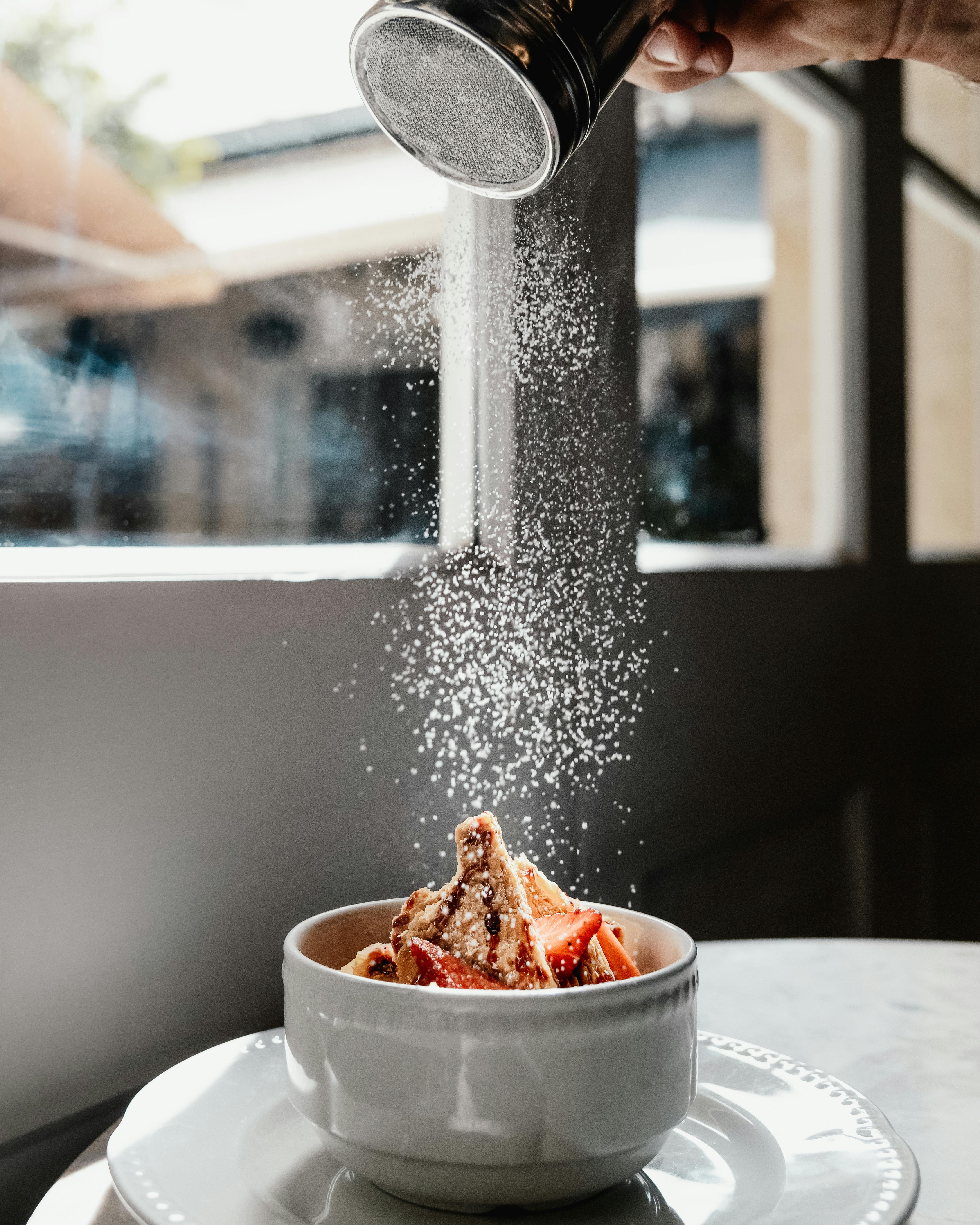 Adding Ingredient to Food · Free Stock Photo