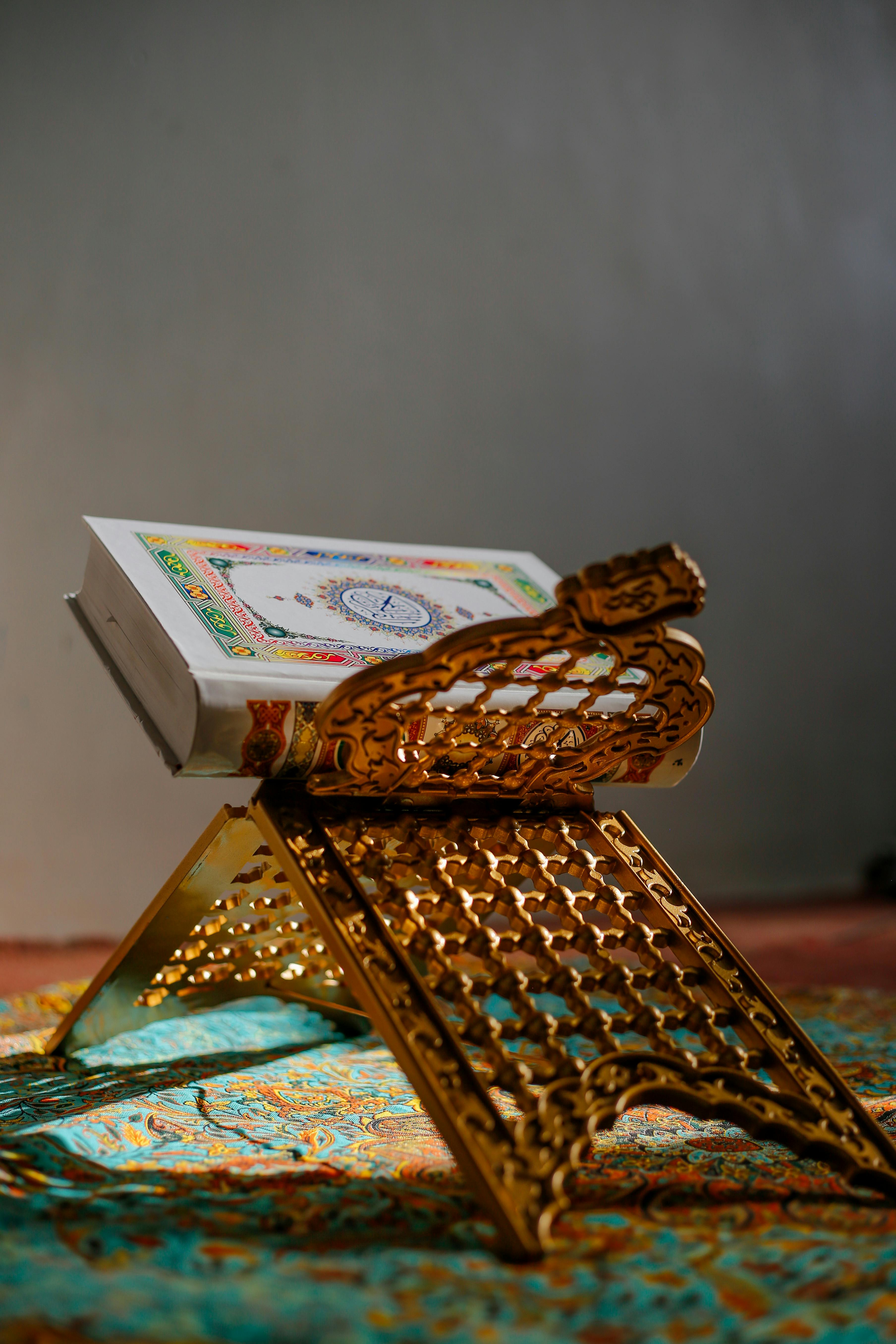 Koran on Metal Stand · Free Stock Photo