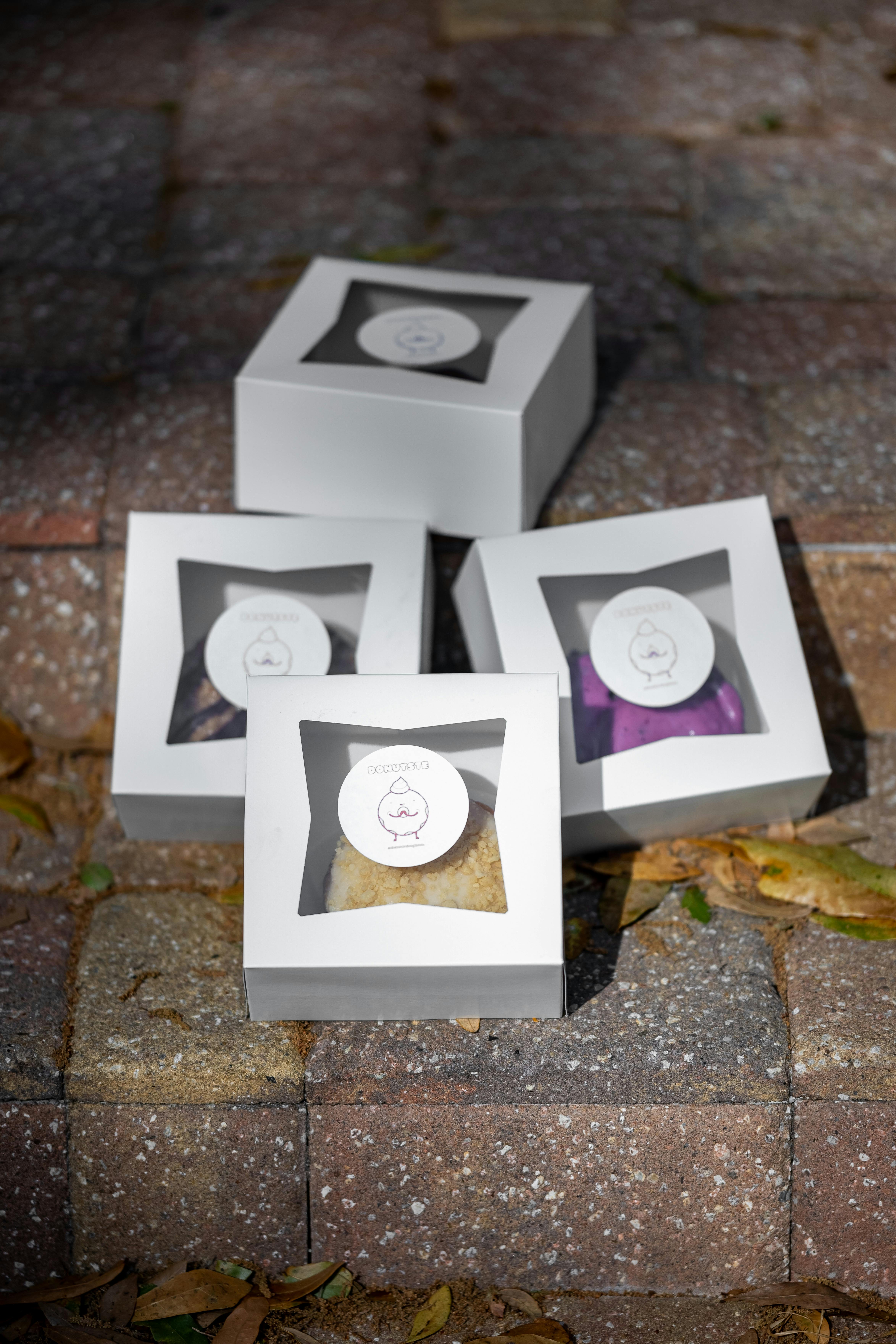 Close up of Boxes on Pavement · Free Stock Photo