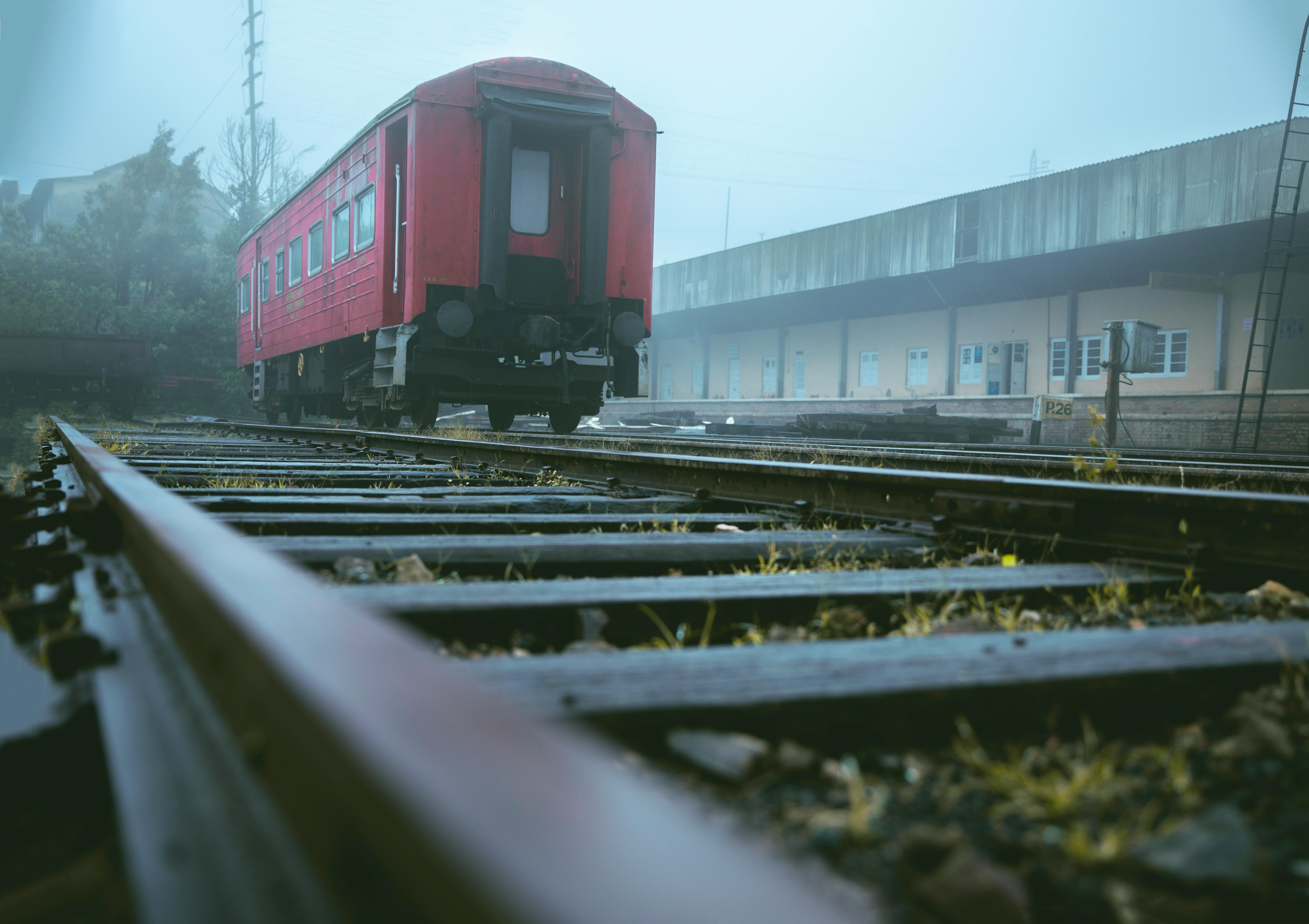 Vintage Train Car on Track · Free Stock Photo