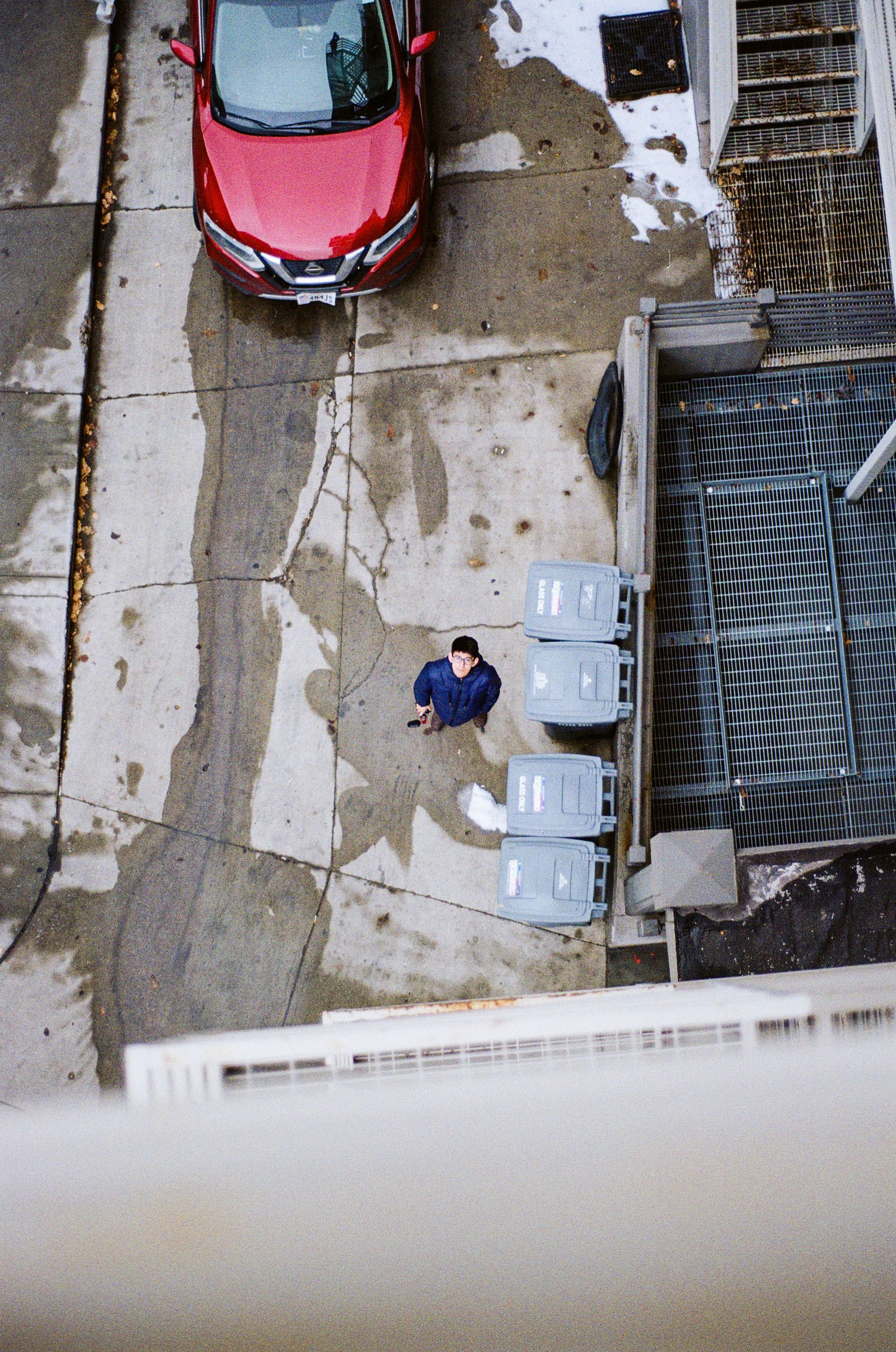 Person on Pavement Looking Up · Free Stock Photo