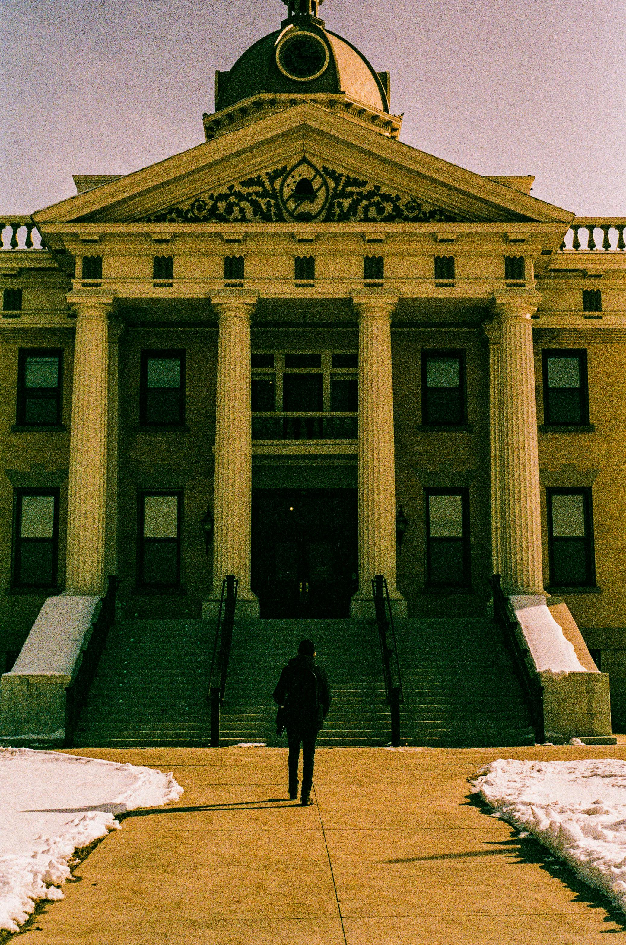 Person in Front of Courthouse · Free Stock Photo