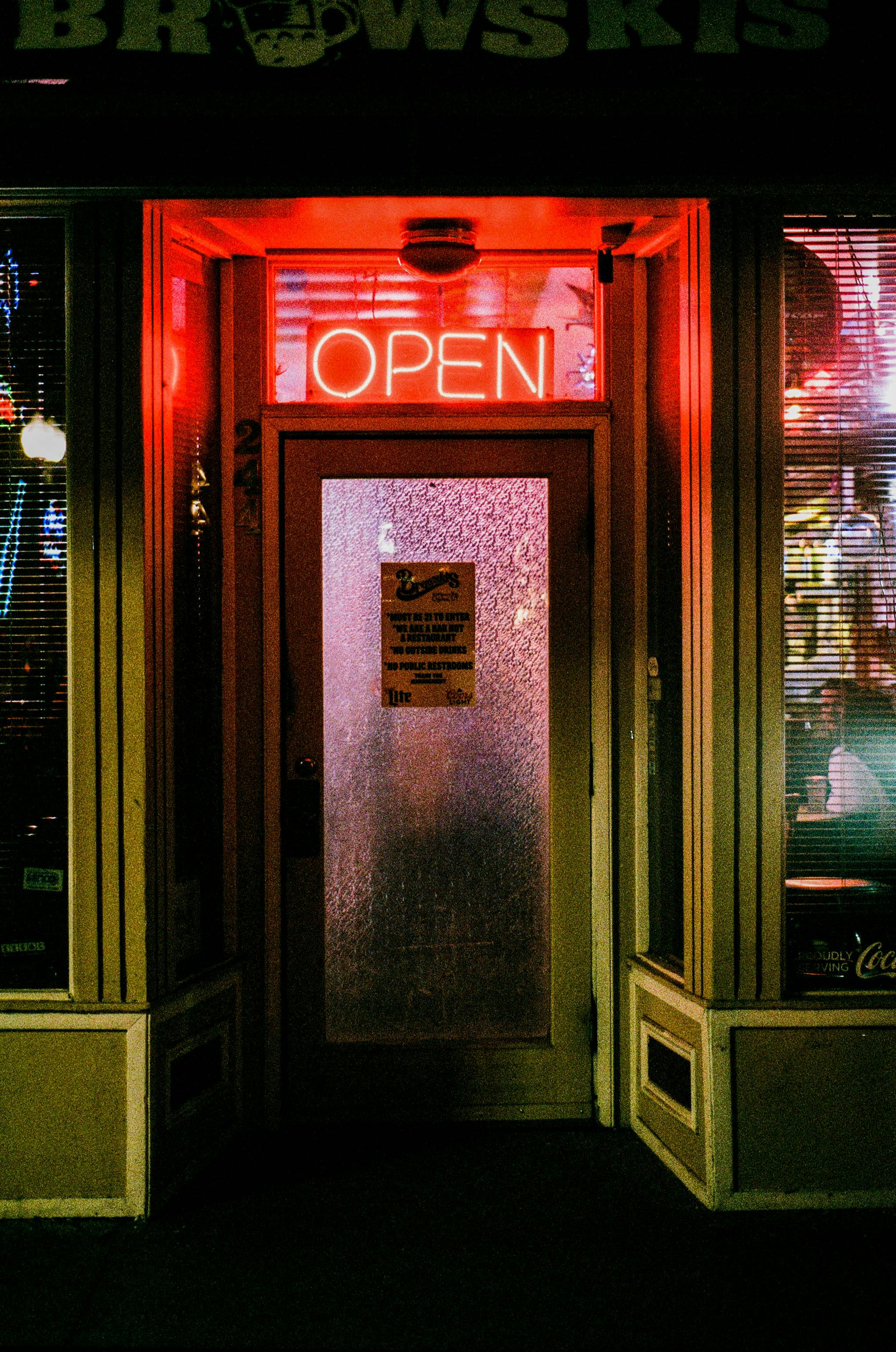 Illuminated Entrance to Restaurant · Free Stock Photo