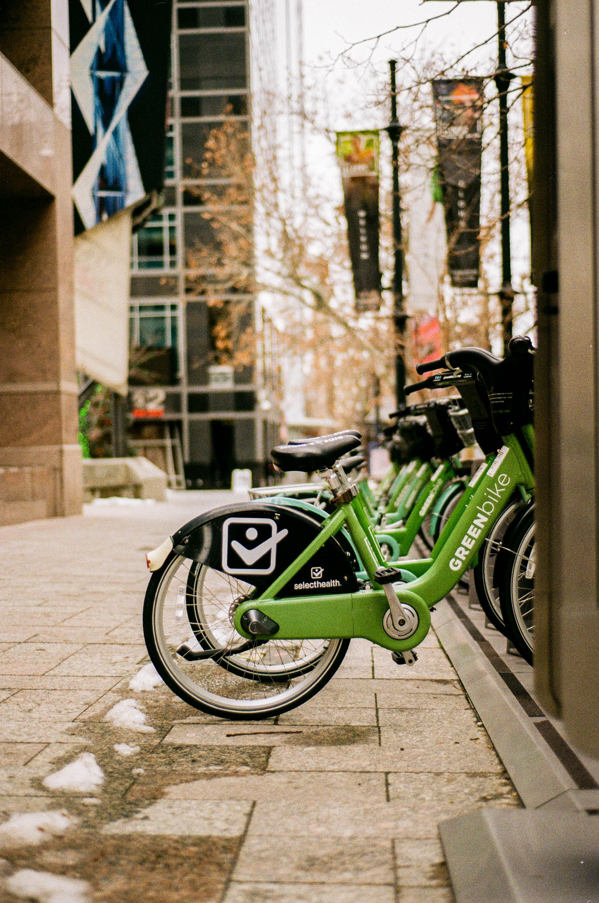 Green Electric Public Bikes · Free Stock Photo