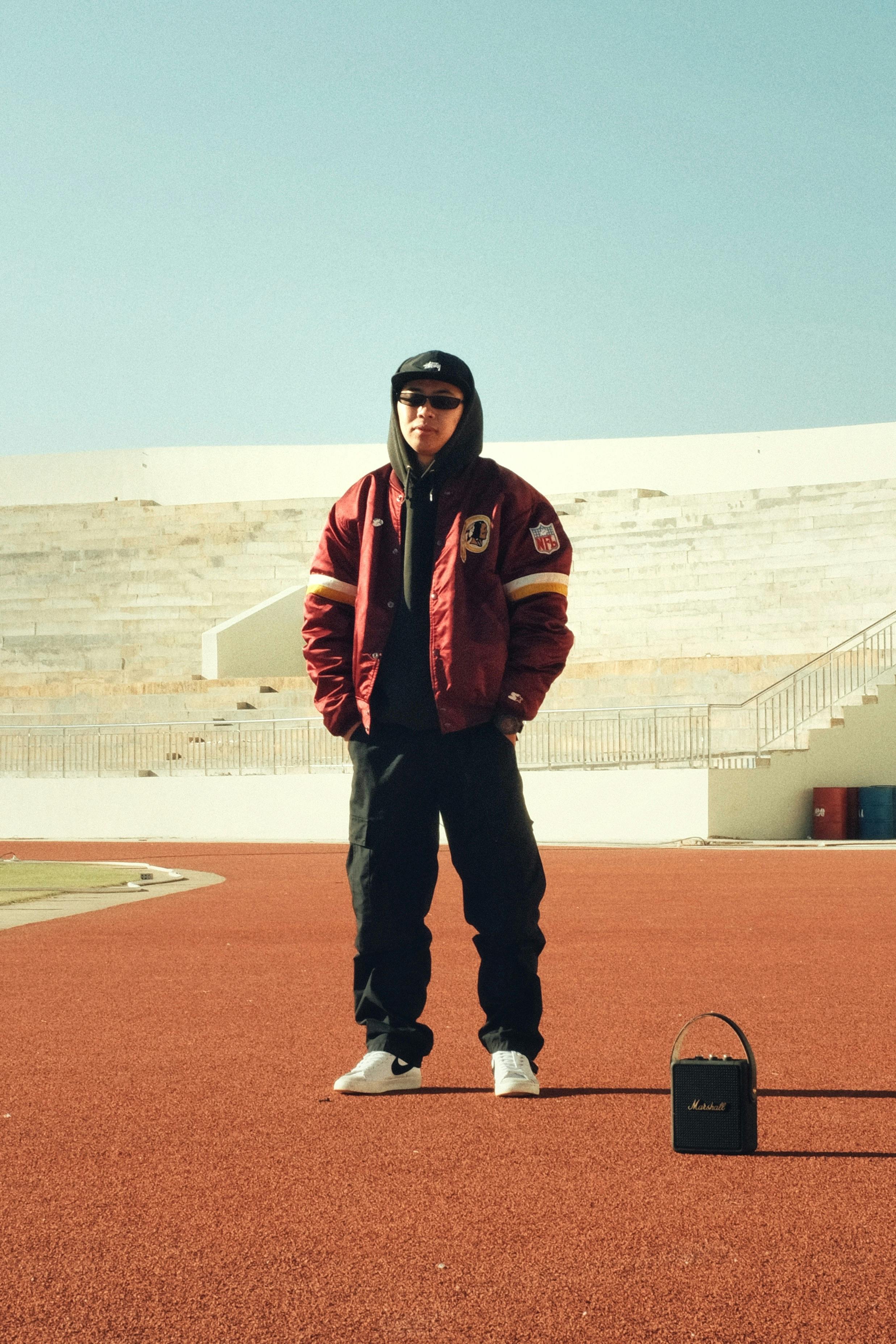 Man Standing on Running Tack · Free Stock Photo