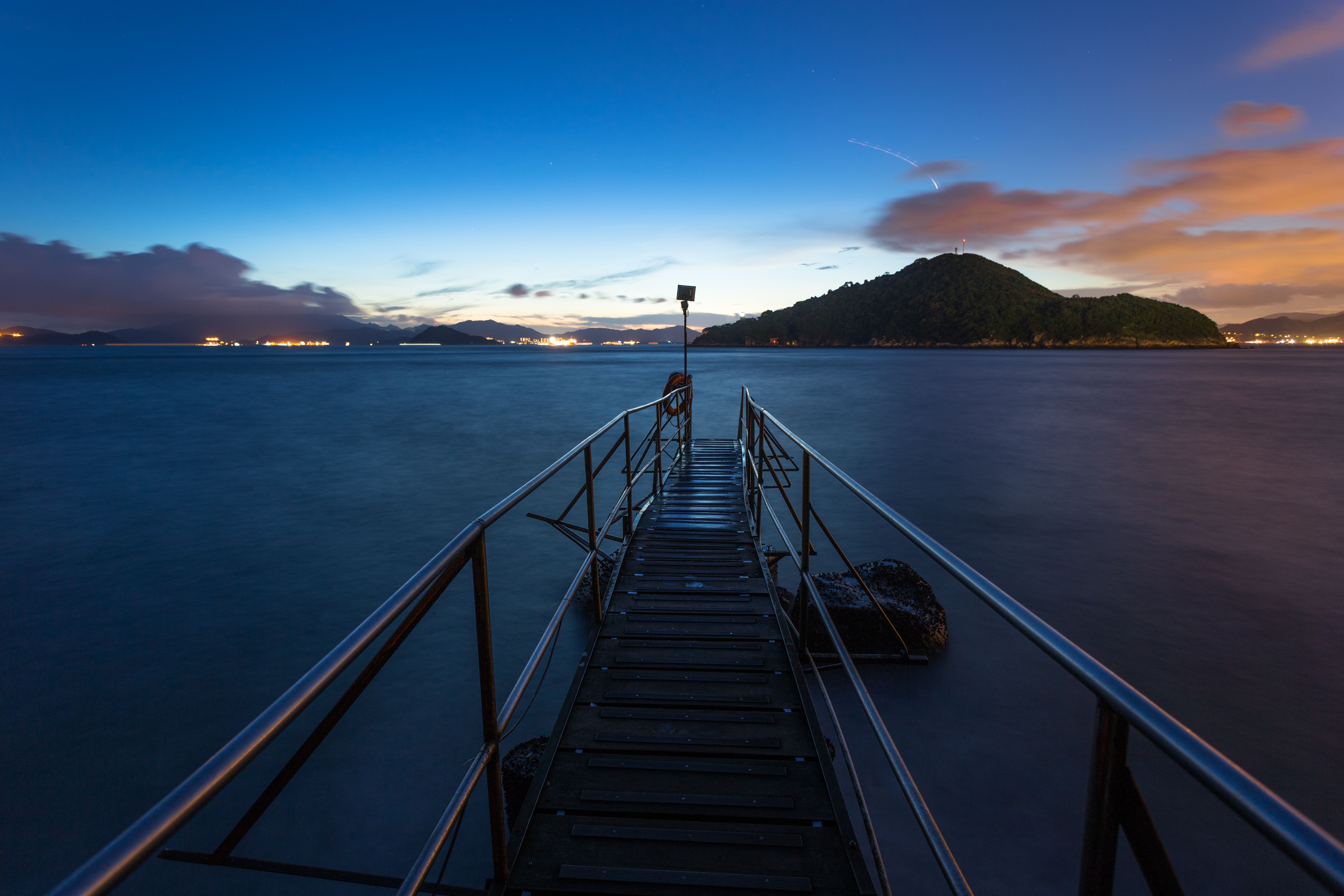 Pier in Water on Dramatic Sunset · Free Stock Photo