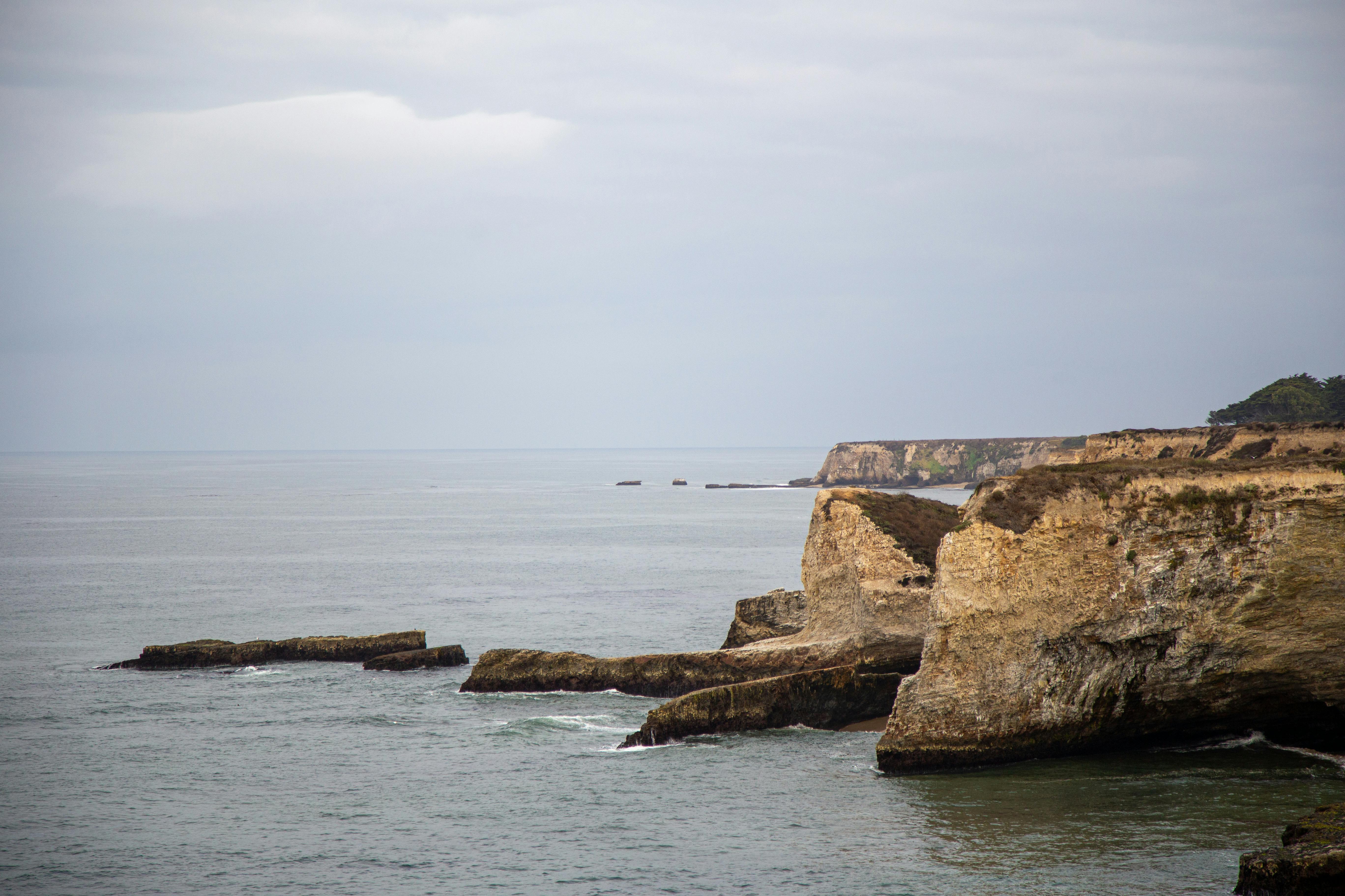 Stones Stacked on Sea Shore · Free Stock Photo