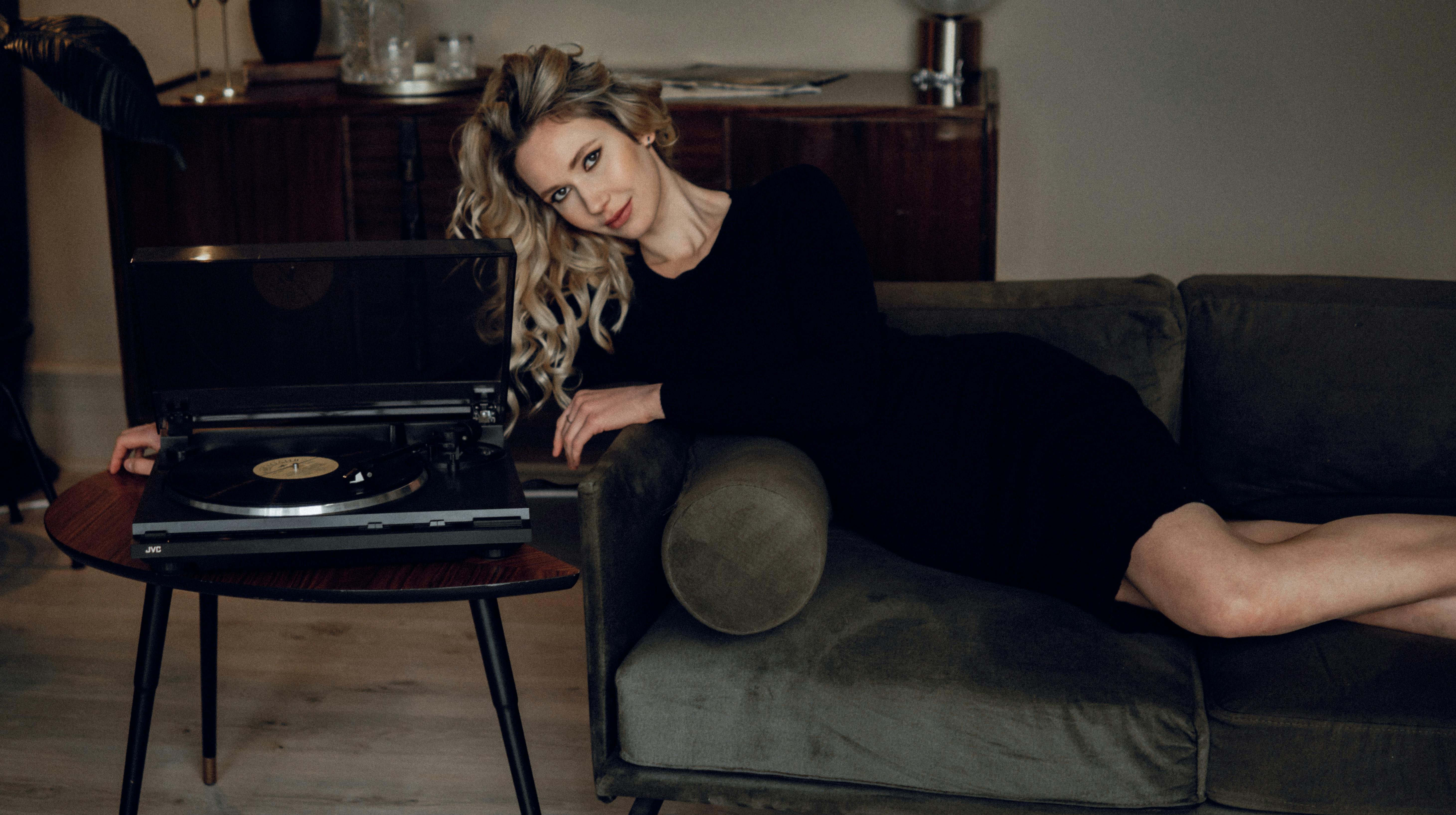 Sexy Woman Lying on Couch at Home · Free Stock Photo