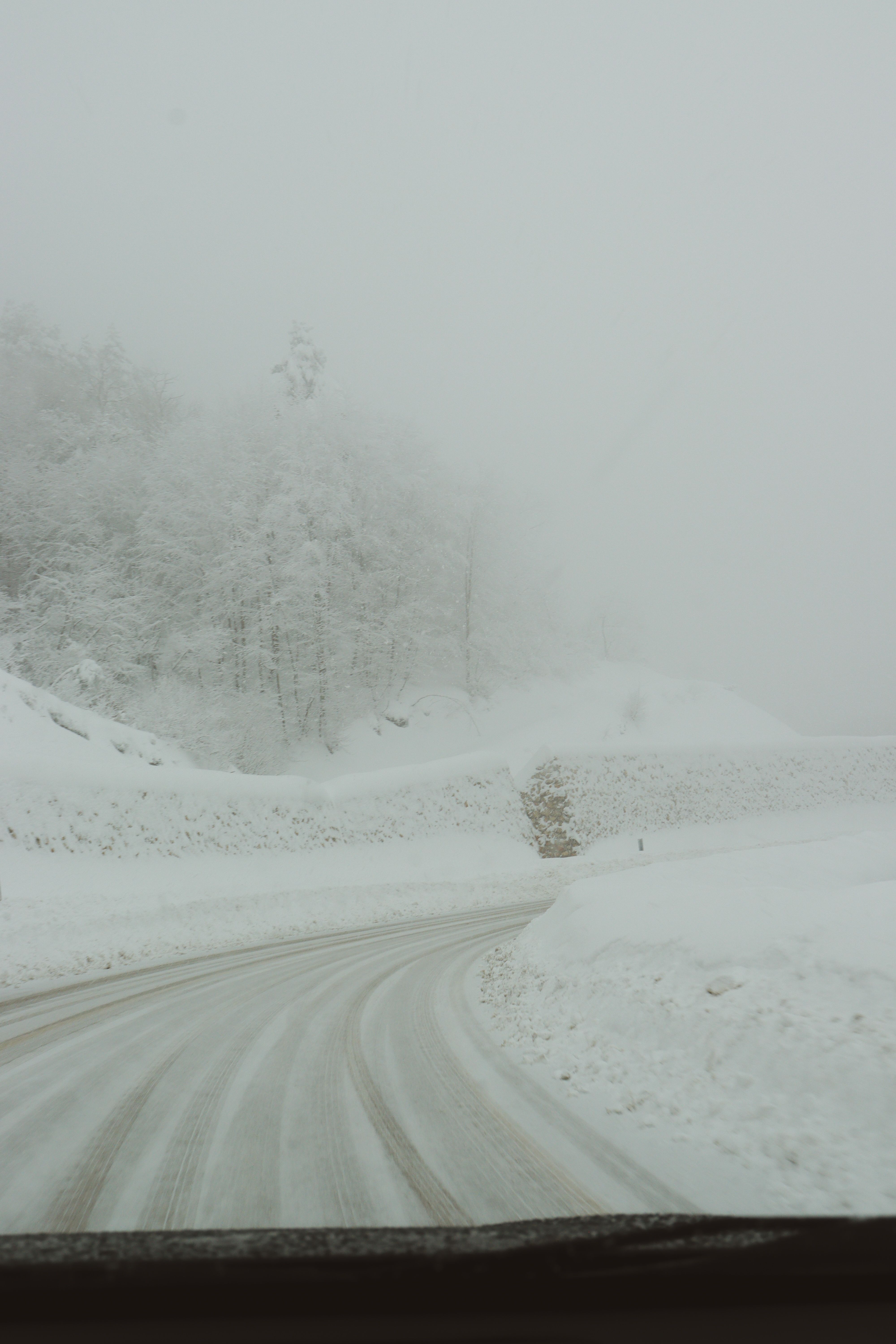 Road during a Heavy Snowfall Photographed from the Inside of a Car ...