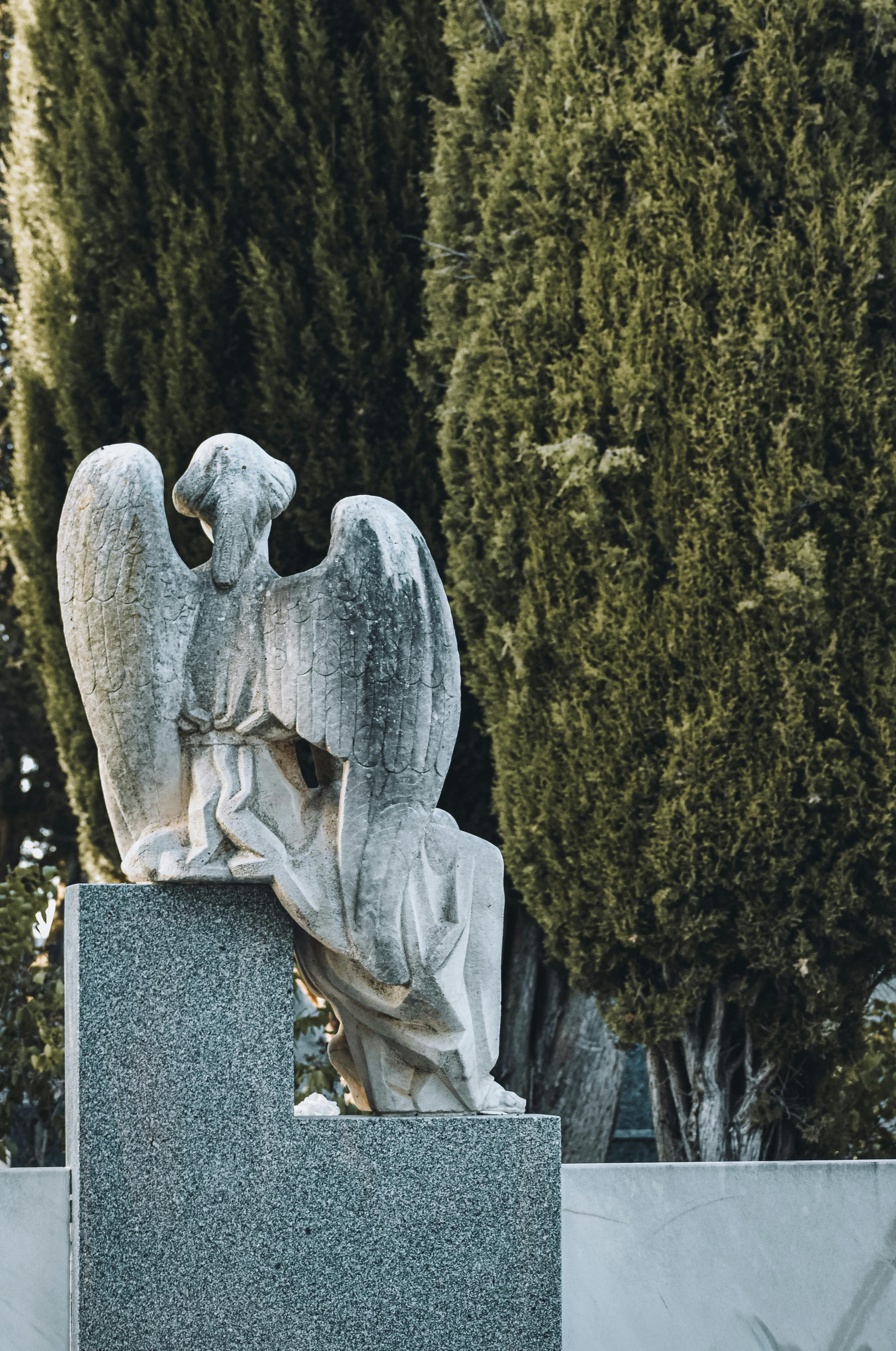 Tombstone with Sculpture · Free Stock Photo