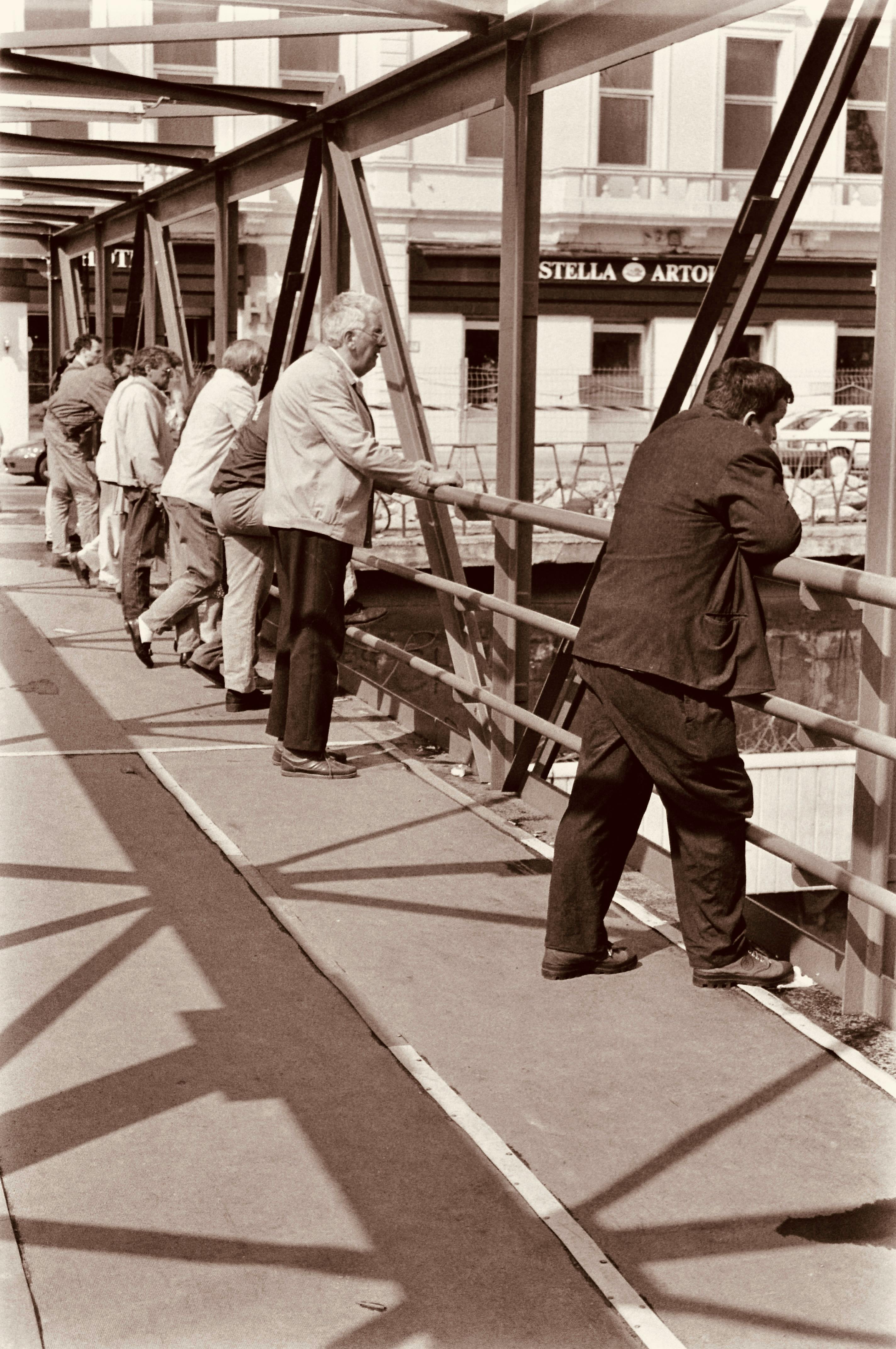 People Standing Under the Bridge · Free Stock Photo